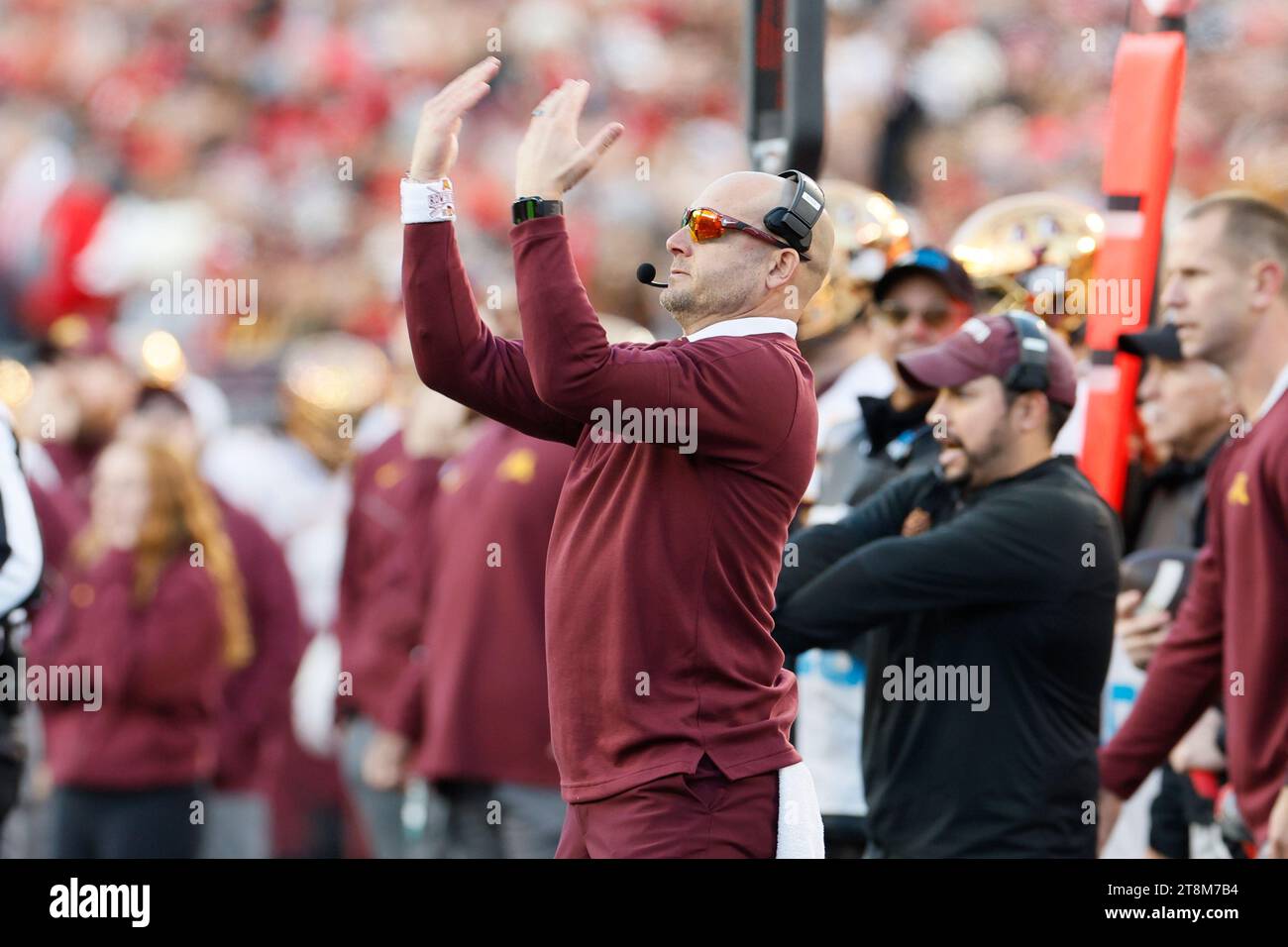 Minnesota head coach P.J. Fleck walks the sidelines during their NCAA ...