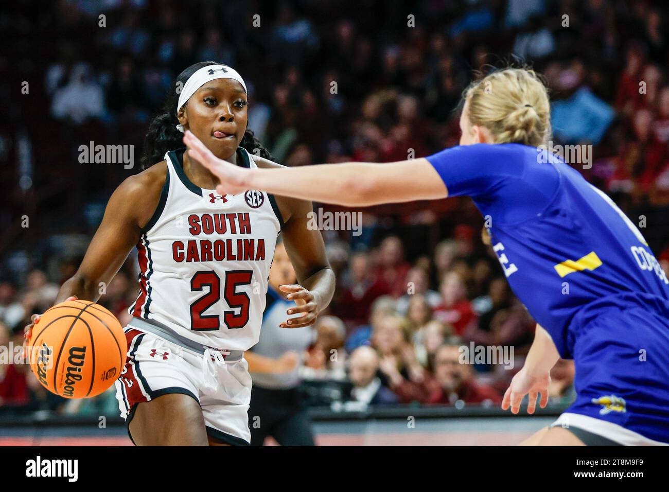 South Carolina guard Raven Johnson, left, drives to the basket against ...