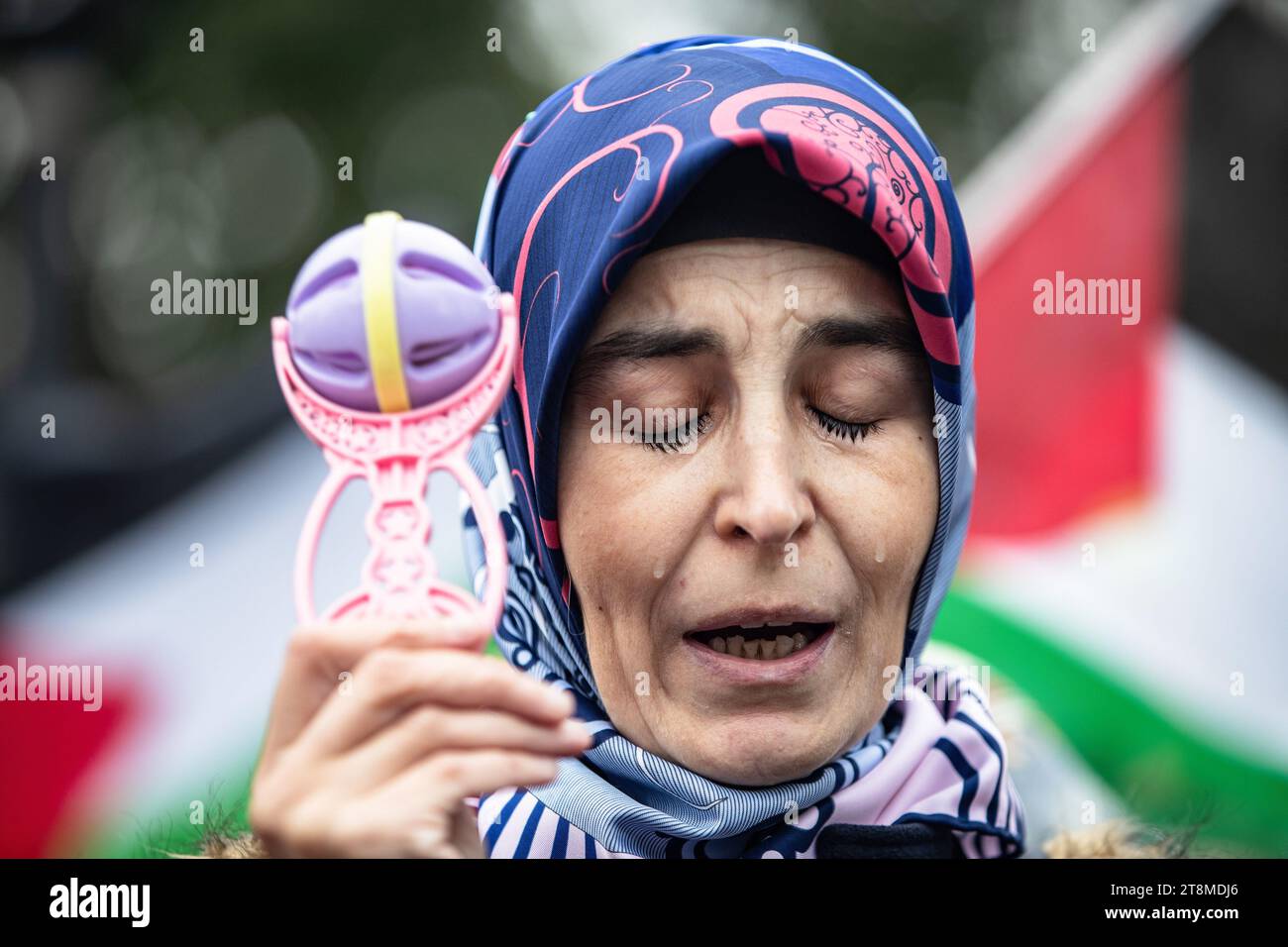 Istanbul, Turkey. 20th Nov, 2023. A woman seen crying while holding a ...