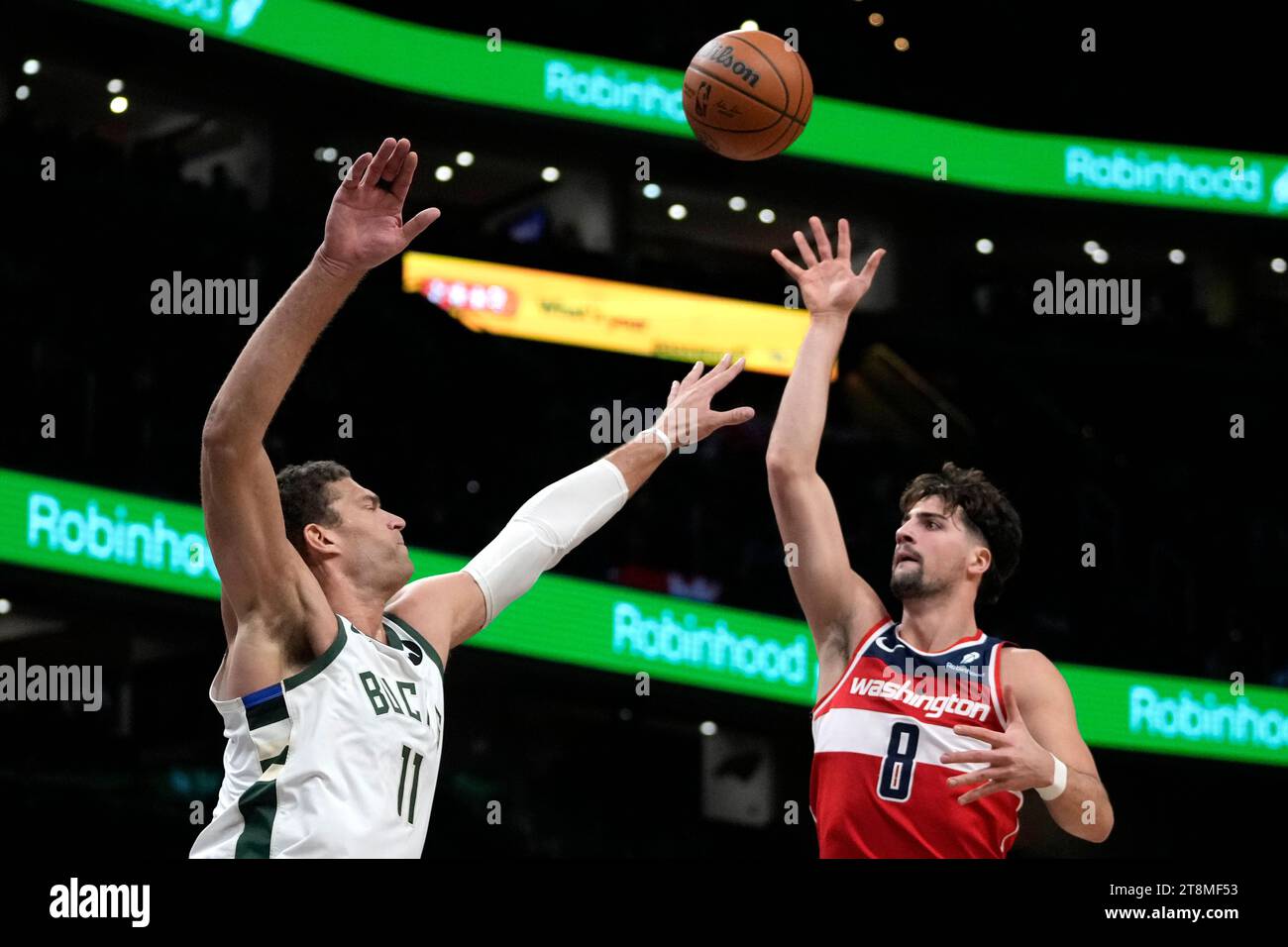 Washington Wizards forward Deni Avdija (8) shoots over Milwaukee Bucks ...