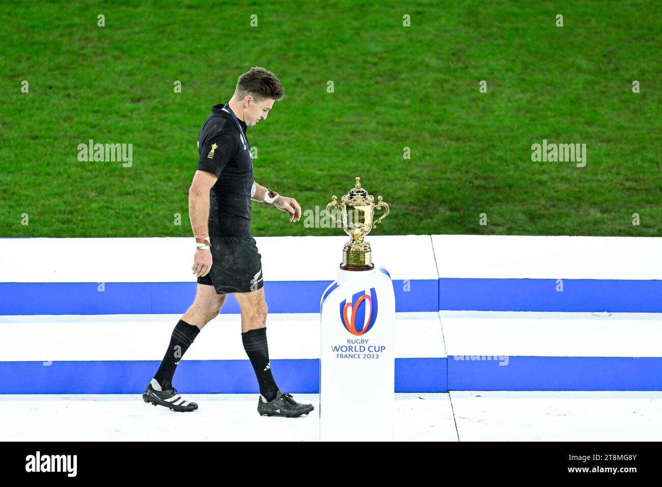 Beauden Barrett passes the William Webb Ellis trophy cup during the ...