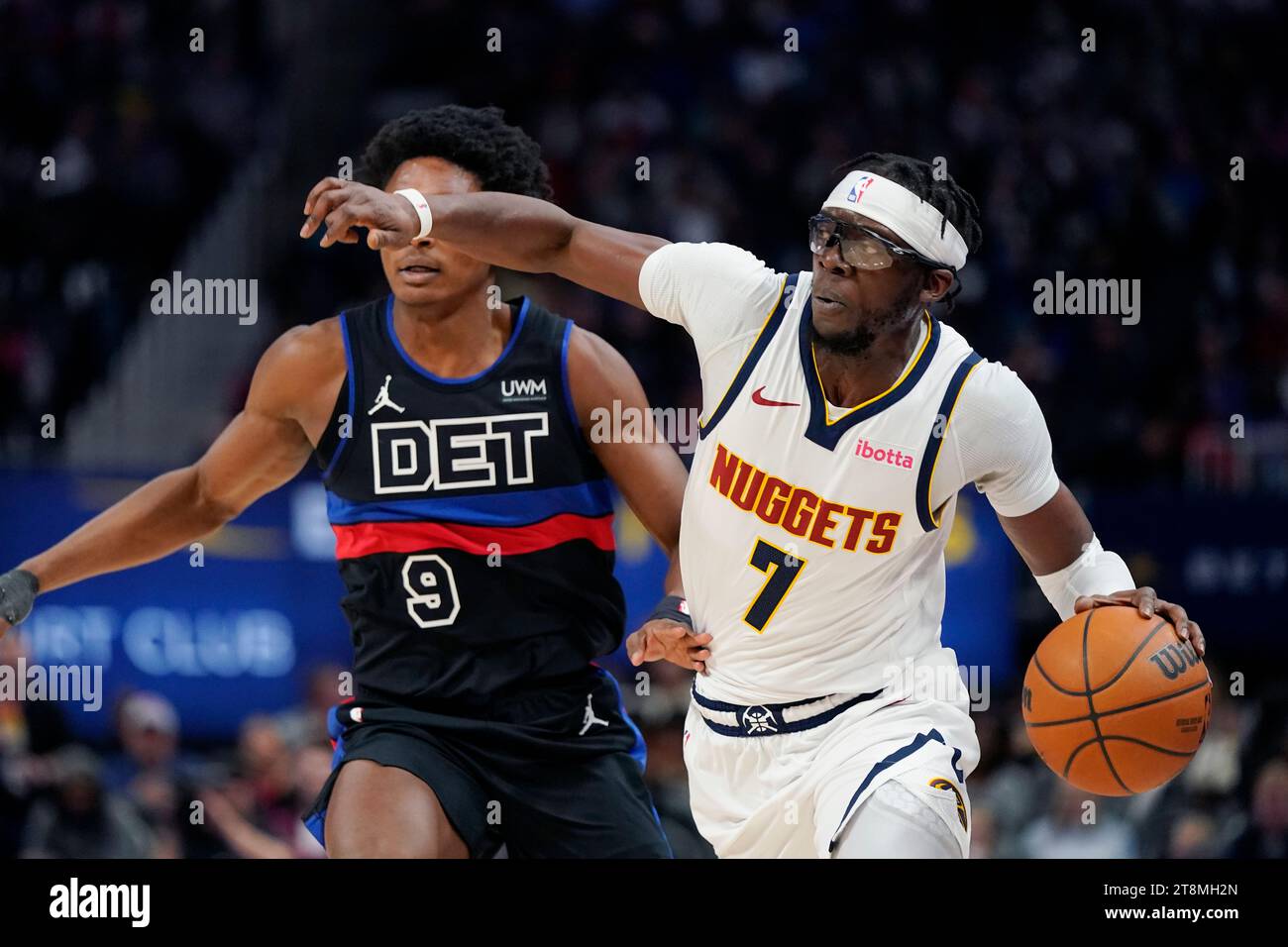 Denver Nuggets guard Reggie Jackson (7) drives past Detroit Pistons ...