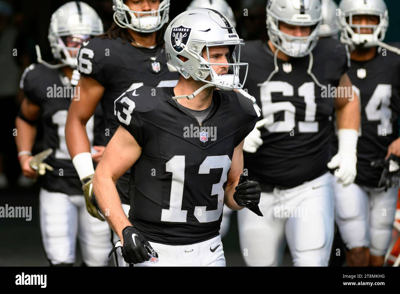 Las Vegas Raiders wide receiver Hunter Renfrow (13) runs onto the field ...