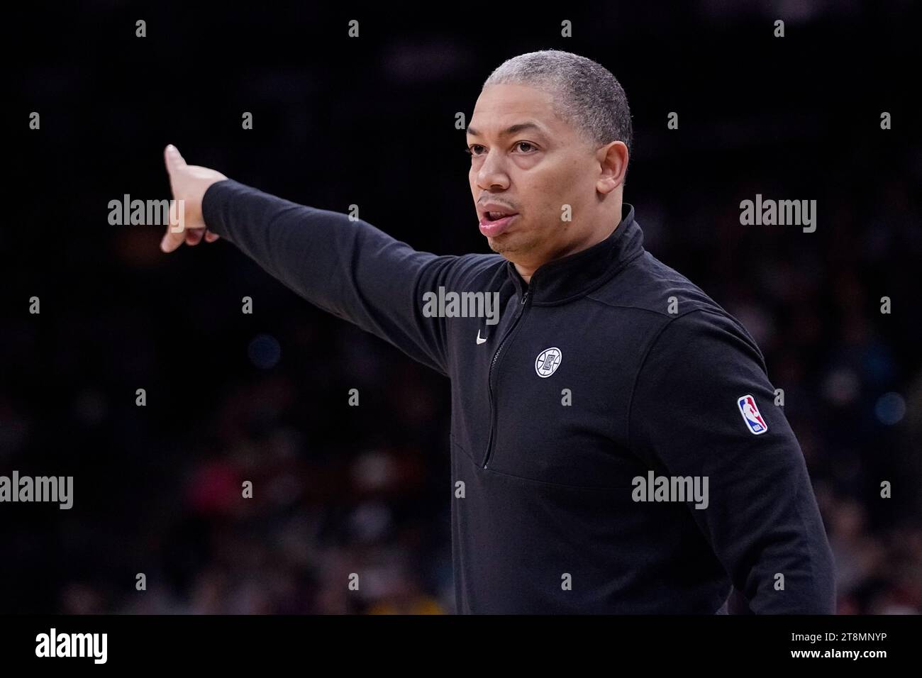 Los Angeles Clippers head coach Tyronn Lue signals to his players ...