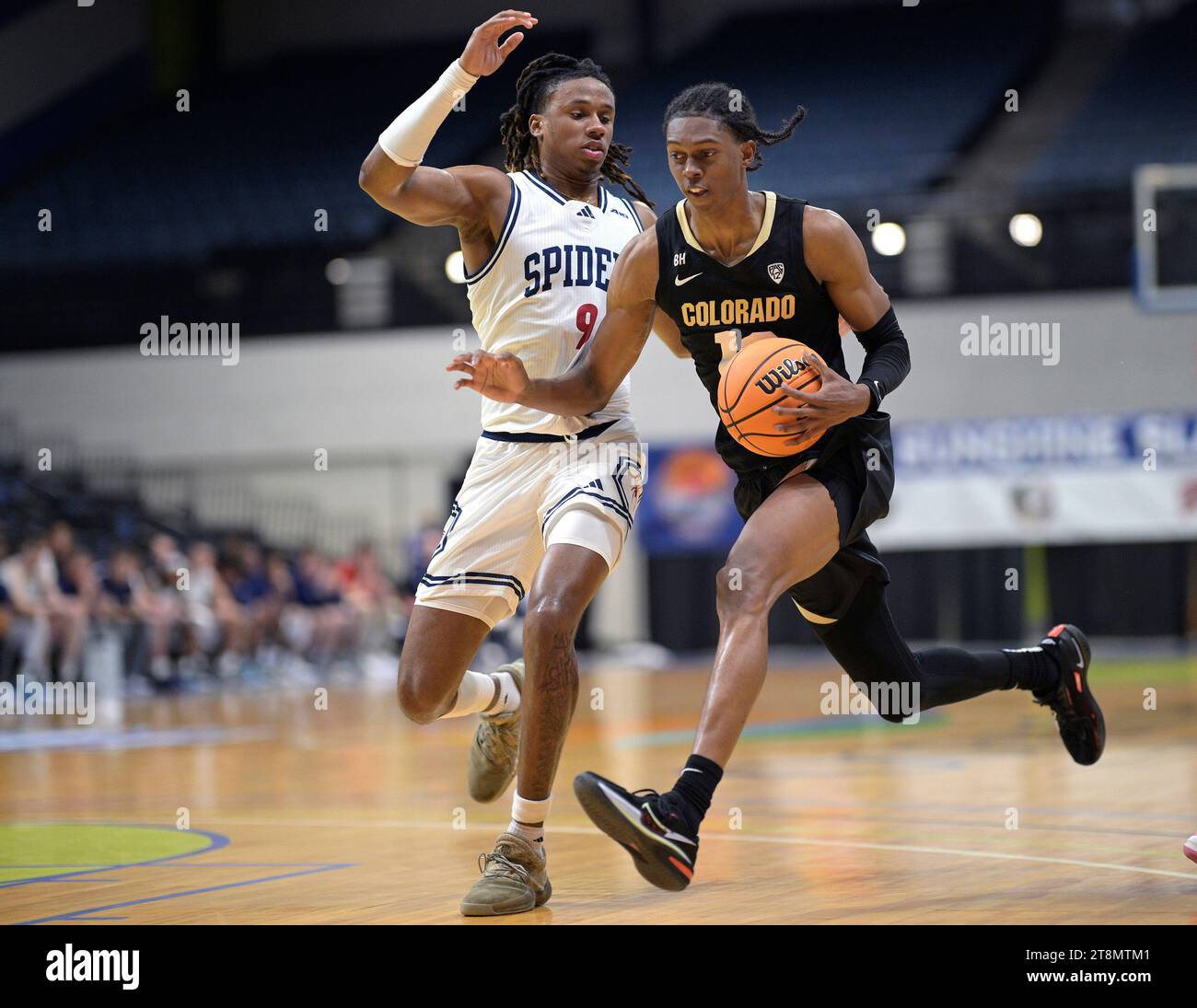 Colorado forward Cody Williams, right, is defended by Richmond forward ...