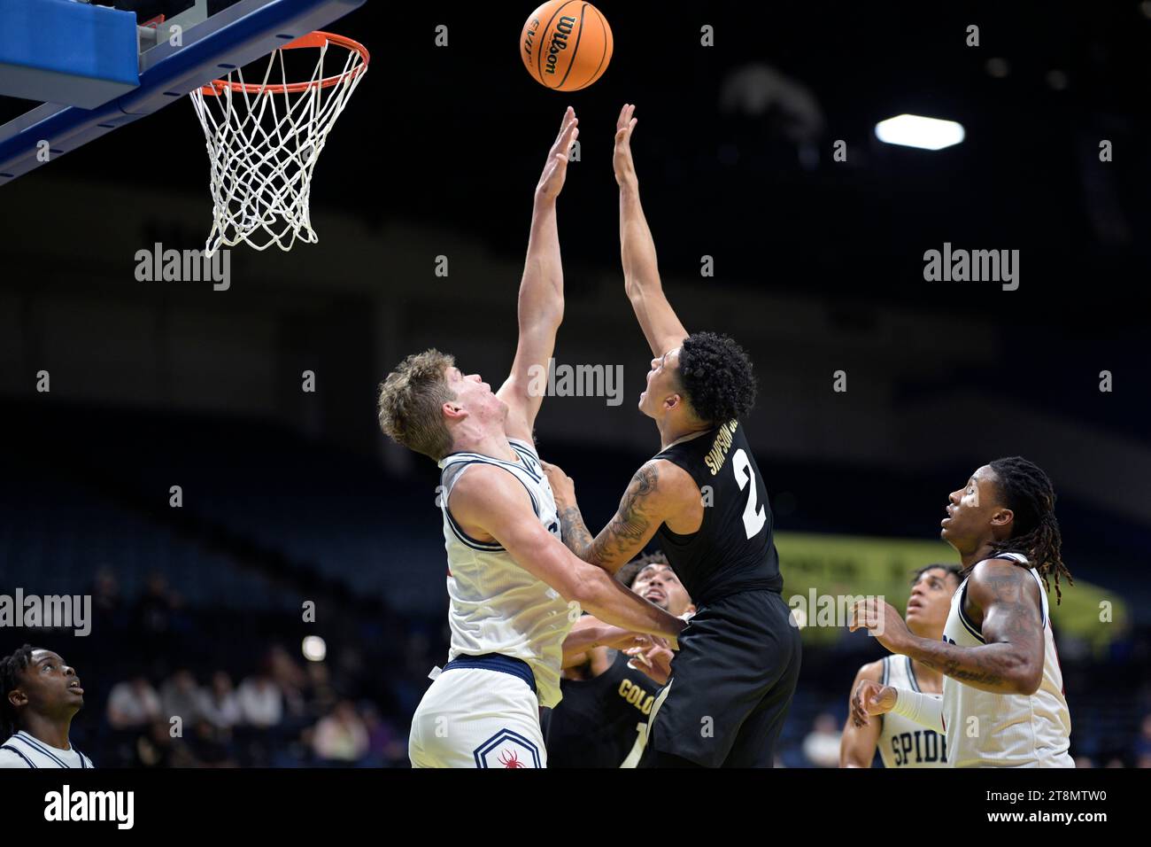 Colorado guard KJ Simpson (2) shoots in front of Richmond center Mike ...