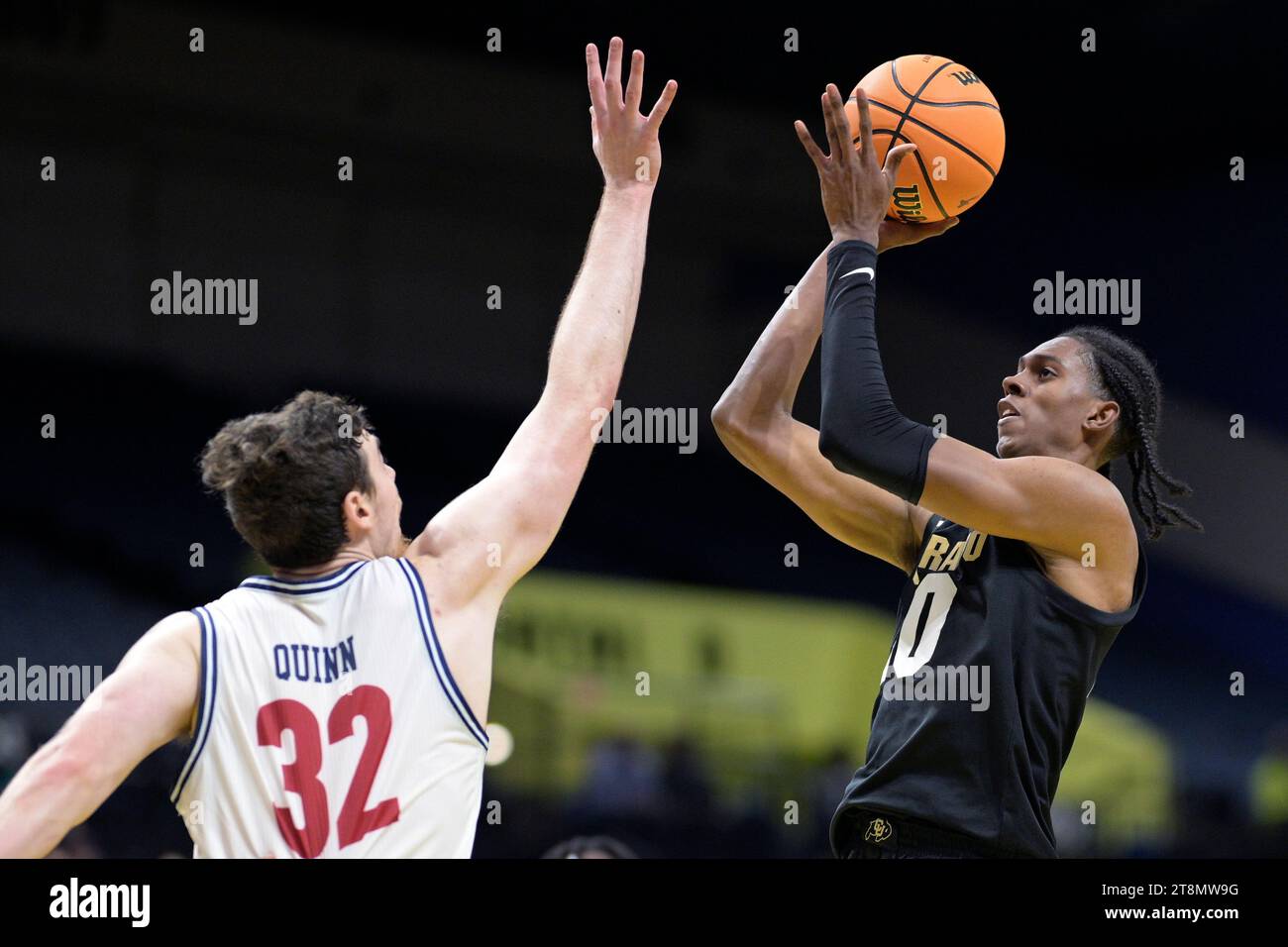 Colorado forward Cody Williams, right, shoots in front of Richmond ...