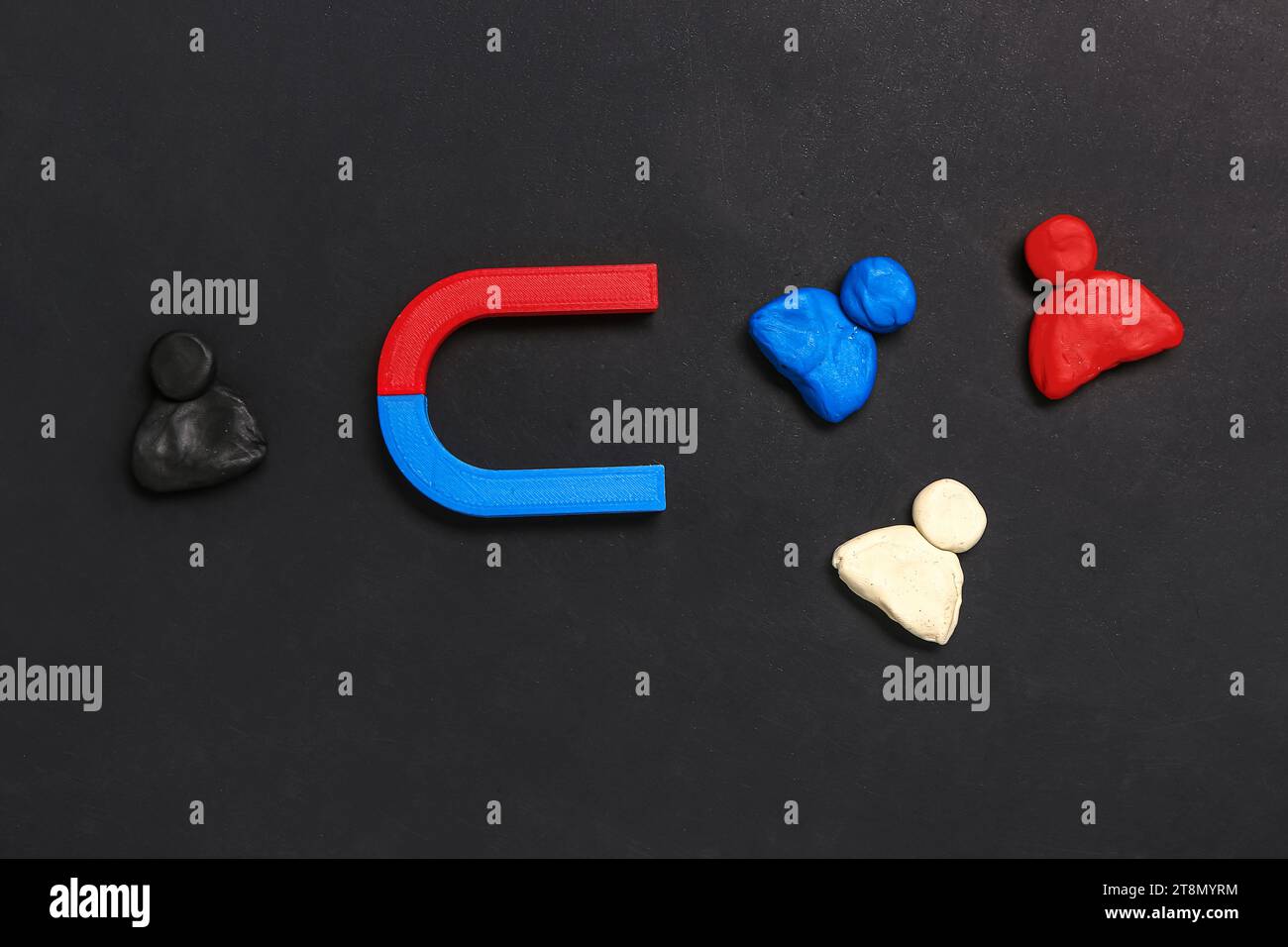 Magnet with leader and group of customers on grunge black background ...