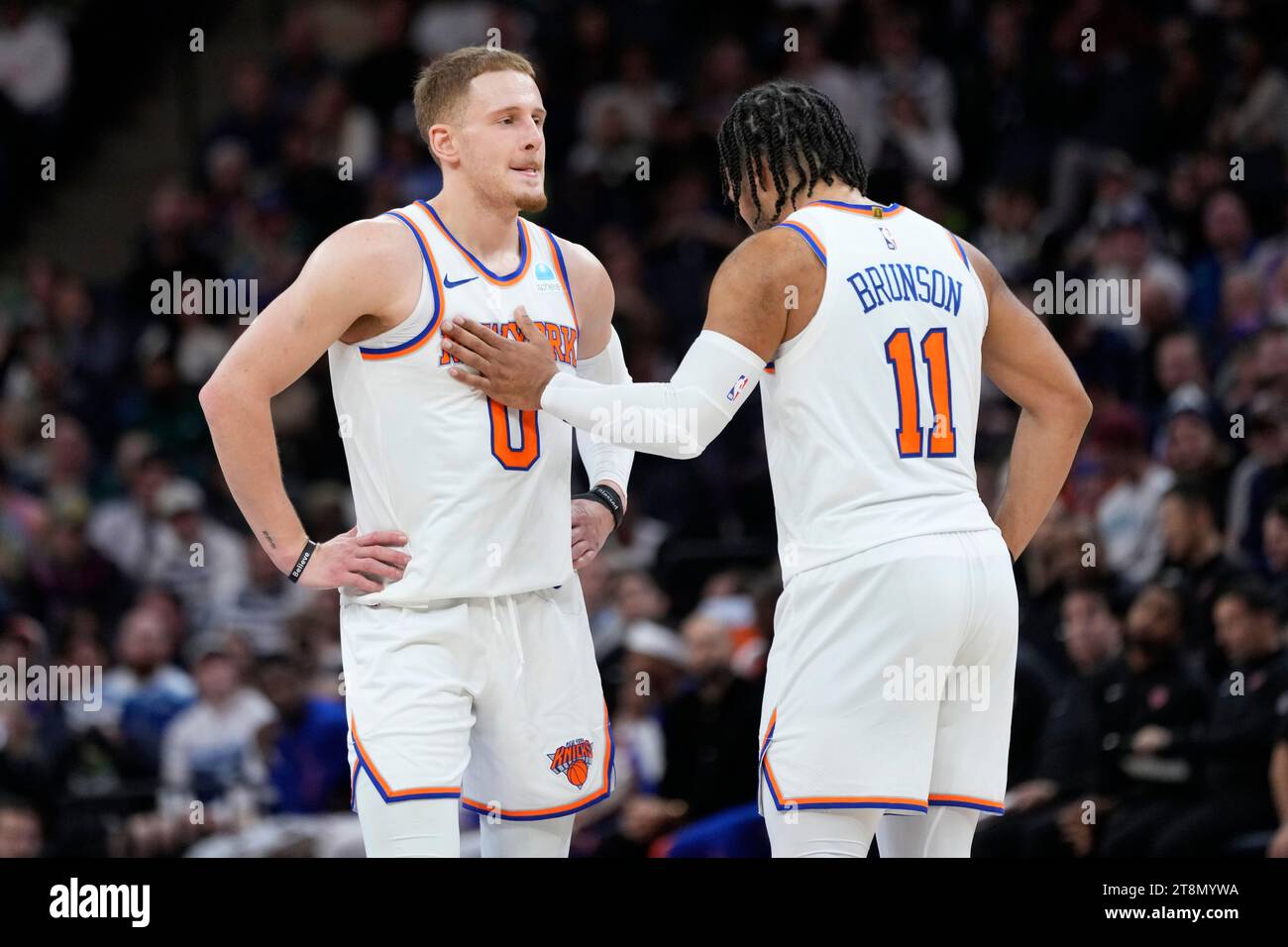 New York Knicks guard Donte DiVincenzo (0) and guard Jalen Brunson (11) stand together during ...