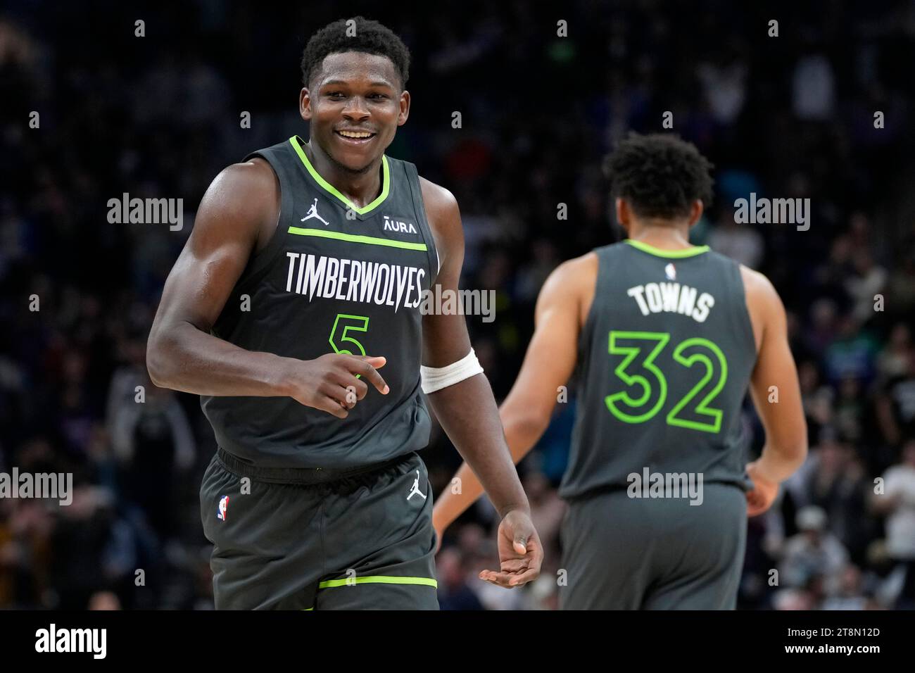Minnesota Timberwolves guard Anthony Edwards (5) runs down the court ...