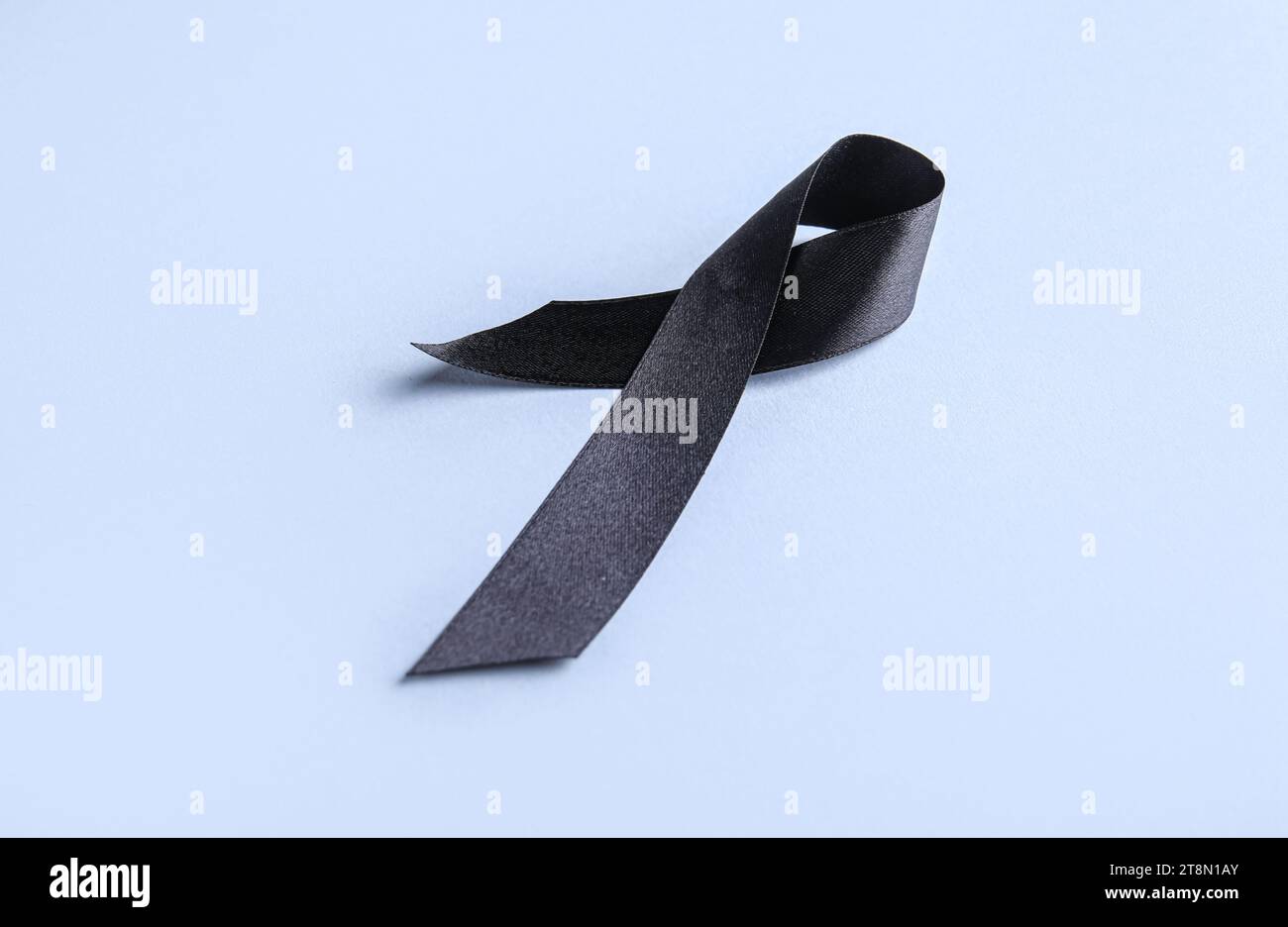 Black funeral ribbon on grey background Stock Photo - Alamy