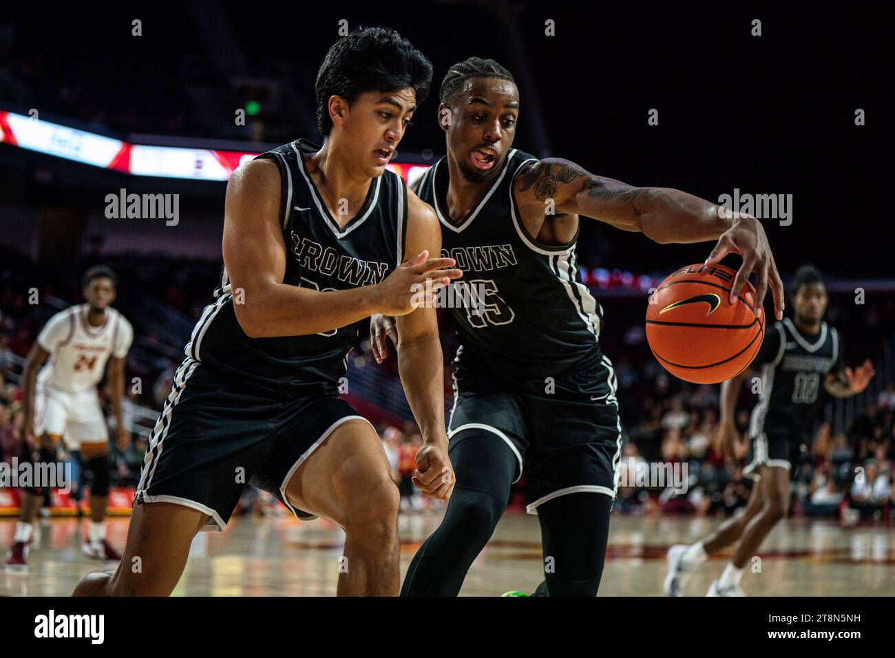 Brown Bears forward Kalu Anya (15) gathers a loose ball during a NCAA ...