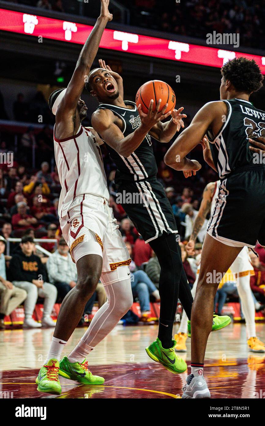 Brown Bears forward Kalu Anya (15) is defended by USC Trojans forward ...
