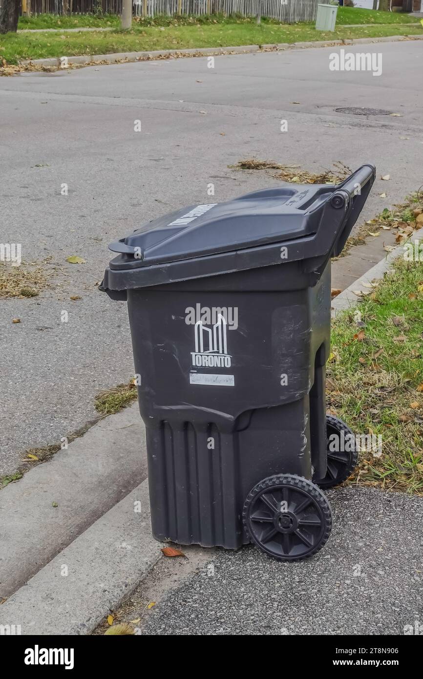 Toronto garbage bin on the side of a residential street during garbage ...
