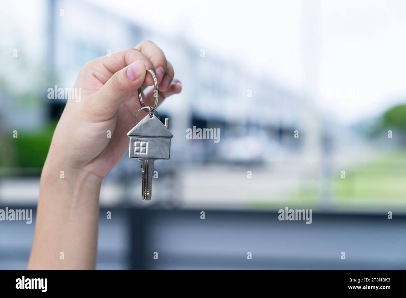 Female Hand Holding House Keys Stock Photo - Alamy