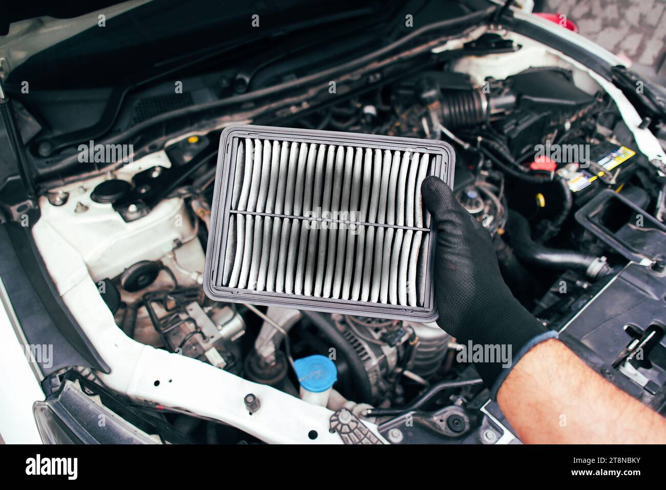 The car air filter is clogged and there are stains on the air filter in ...