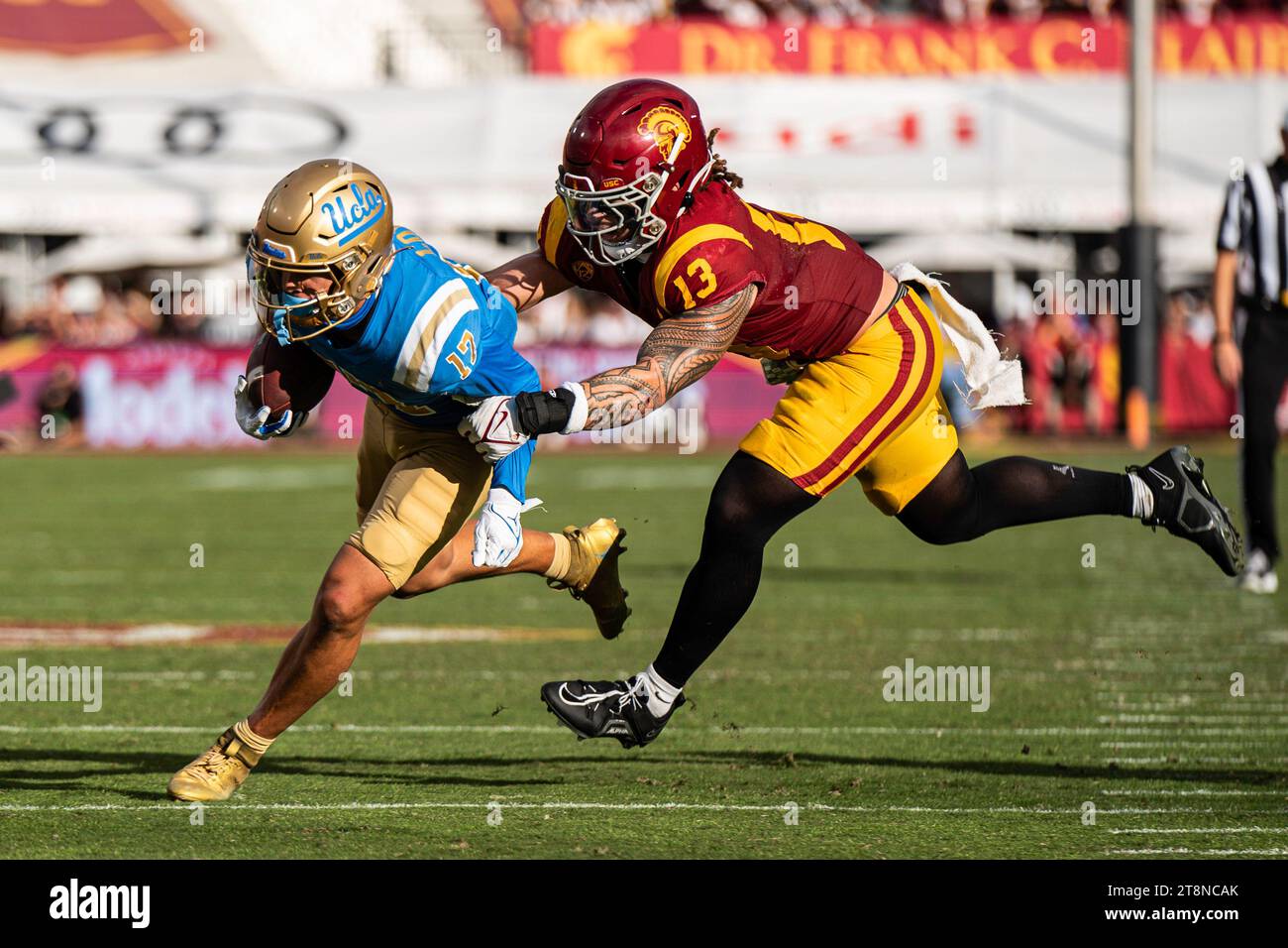 UCLA Bruins wide receiver Logan Loya (17) is defended by USC Trojans ...
