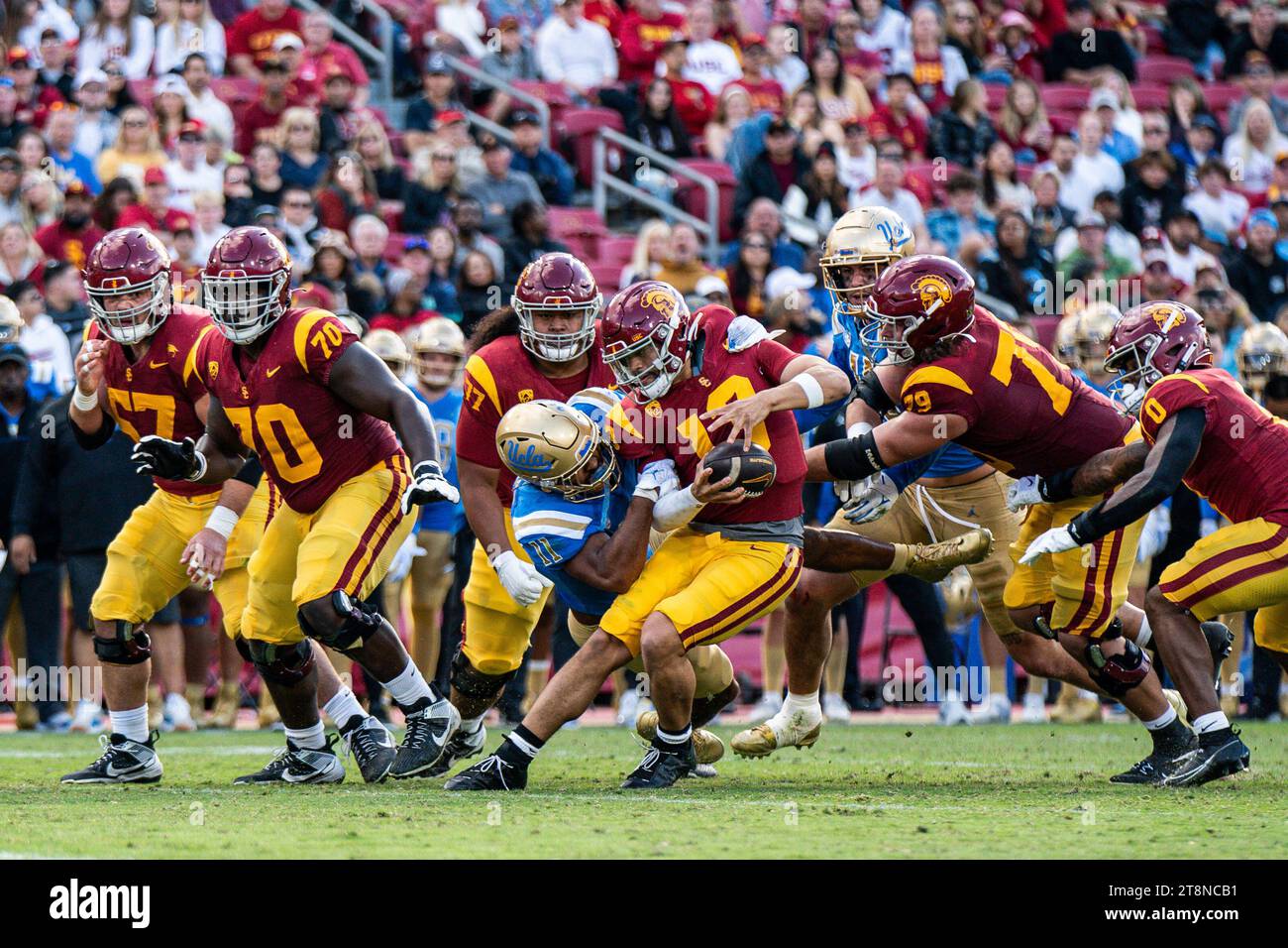 UCLA Bruins defensive lineman Gabriel Murphy (11) sacks USC Trojans ...