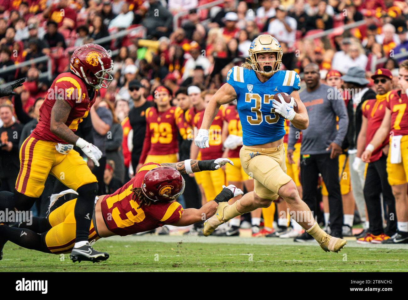 USC Trojans linebacker Mason Cobb (13) misses on a tackle against UCLA ... USC Trojans linebacker Mason Cobb (13) misses on a tackle against UCLA ...