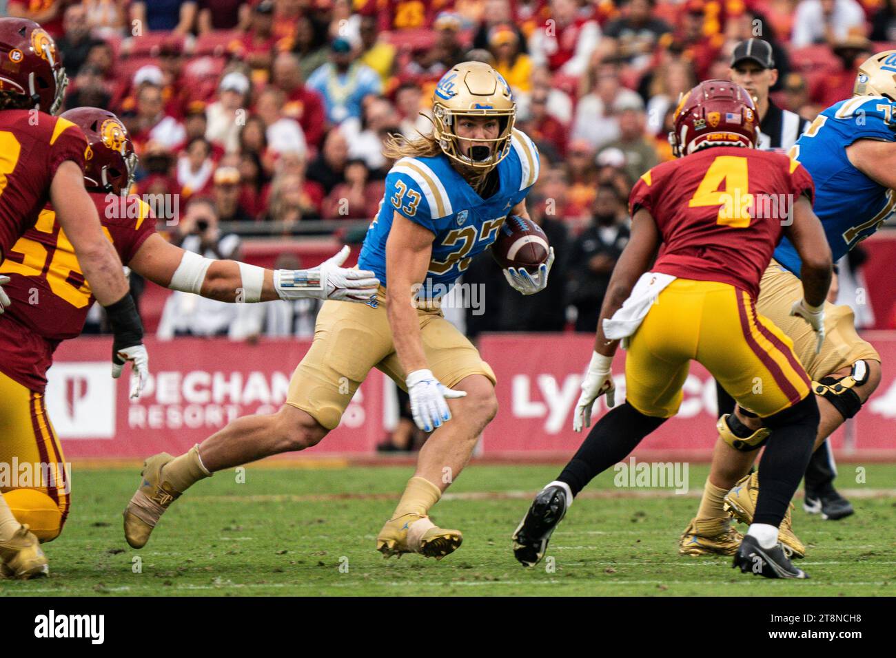 UCLA Bruins running back Carson Steele (33) runs the ball during a NCAA ...