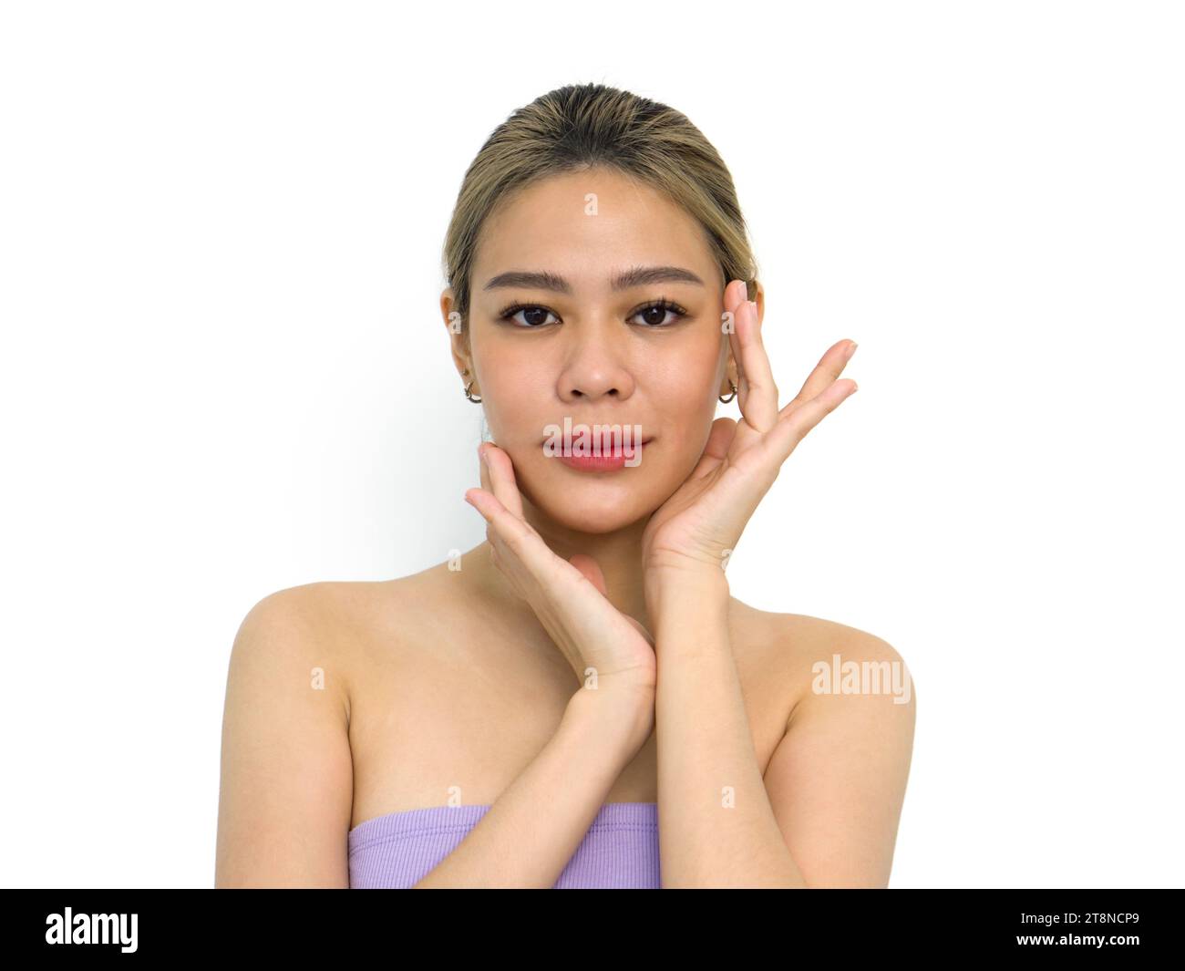 Beautiful young asian woman with clean fresh skin touch her own face ...