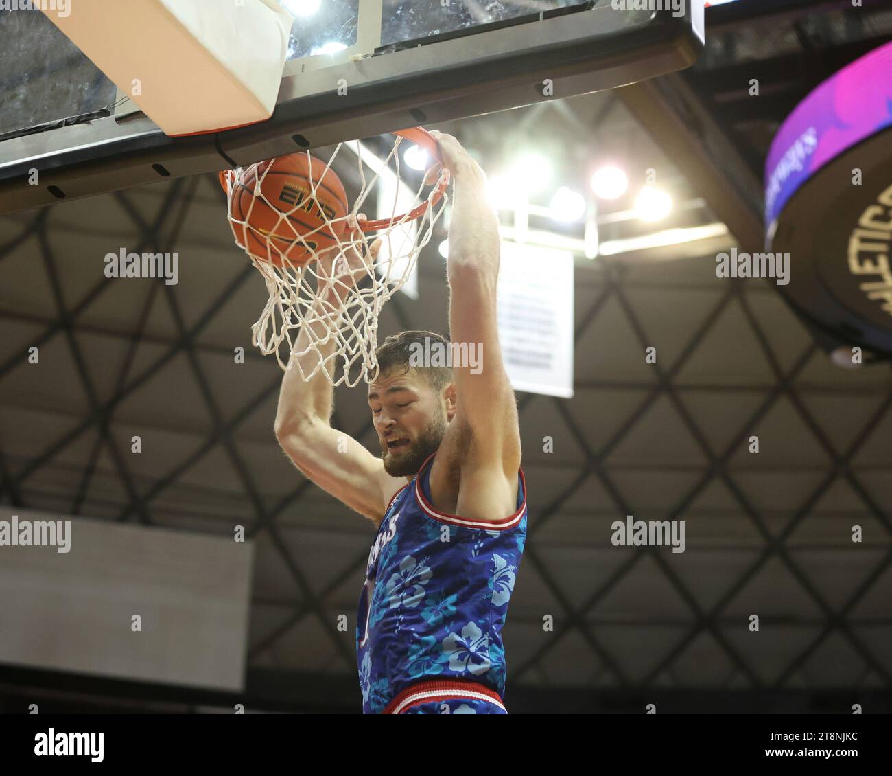 Kansas center Hunter Dickinson (1) makes a slam dunk against Chaminade ...