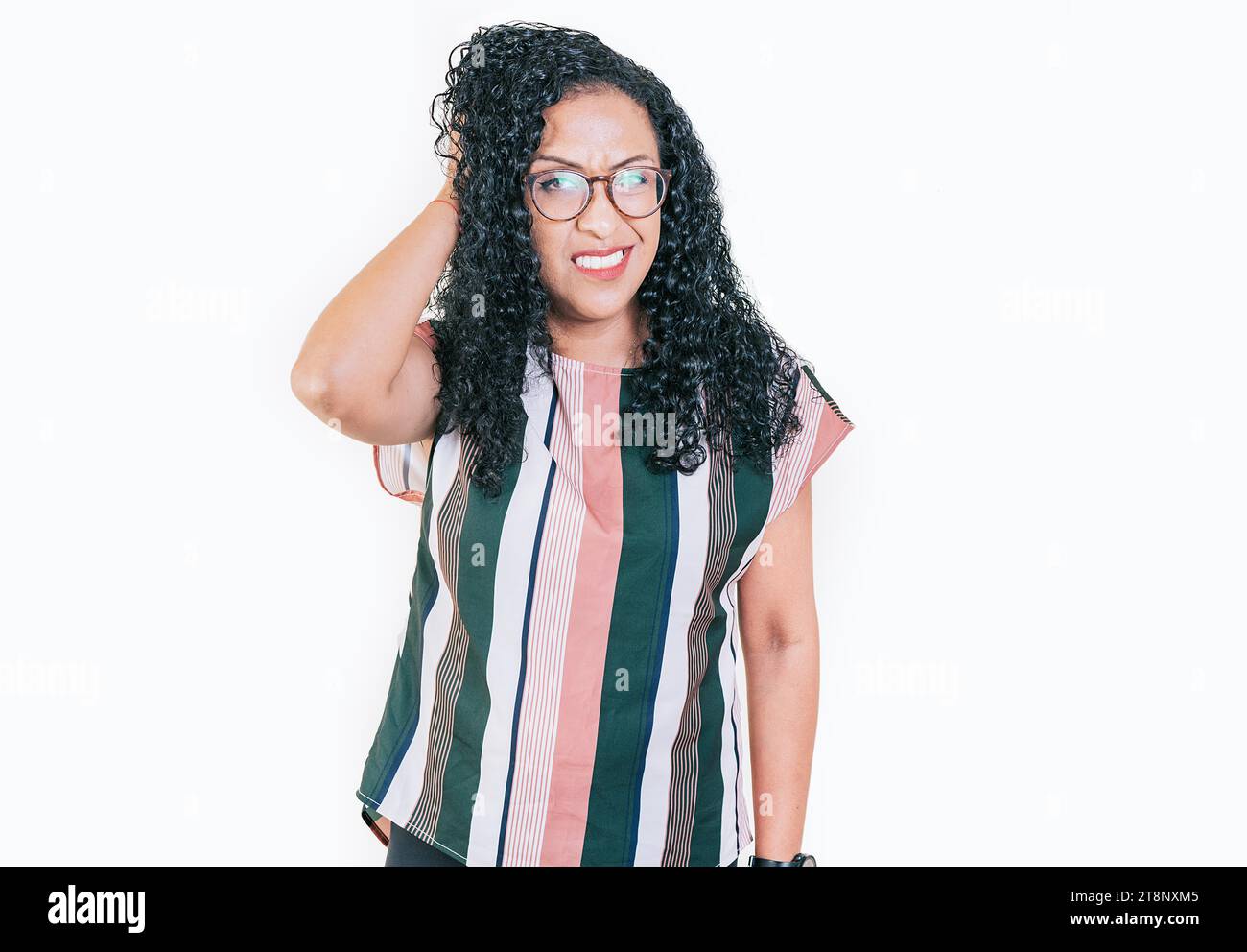 Afro woman scratching head with indecisive expression isolated. Young ...