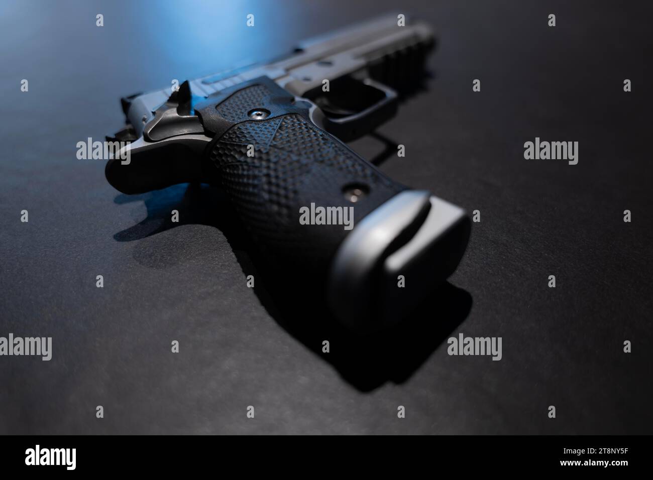 Elegant Chrome Handgun on Gray Granite Background in Switzerland Stock ...
