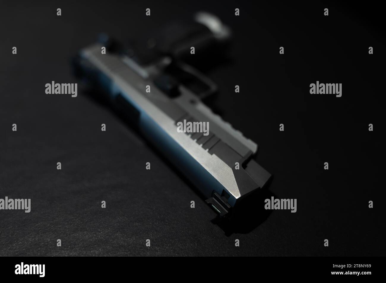 Elegant Chrome Handgun on Gray Granite Background in Switzerland Stock ...