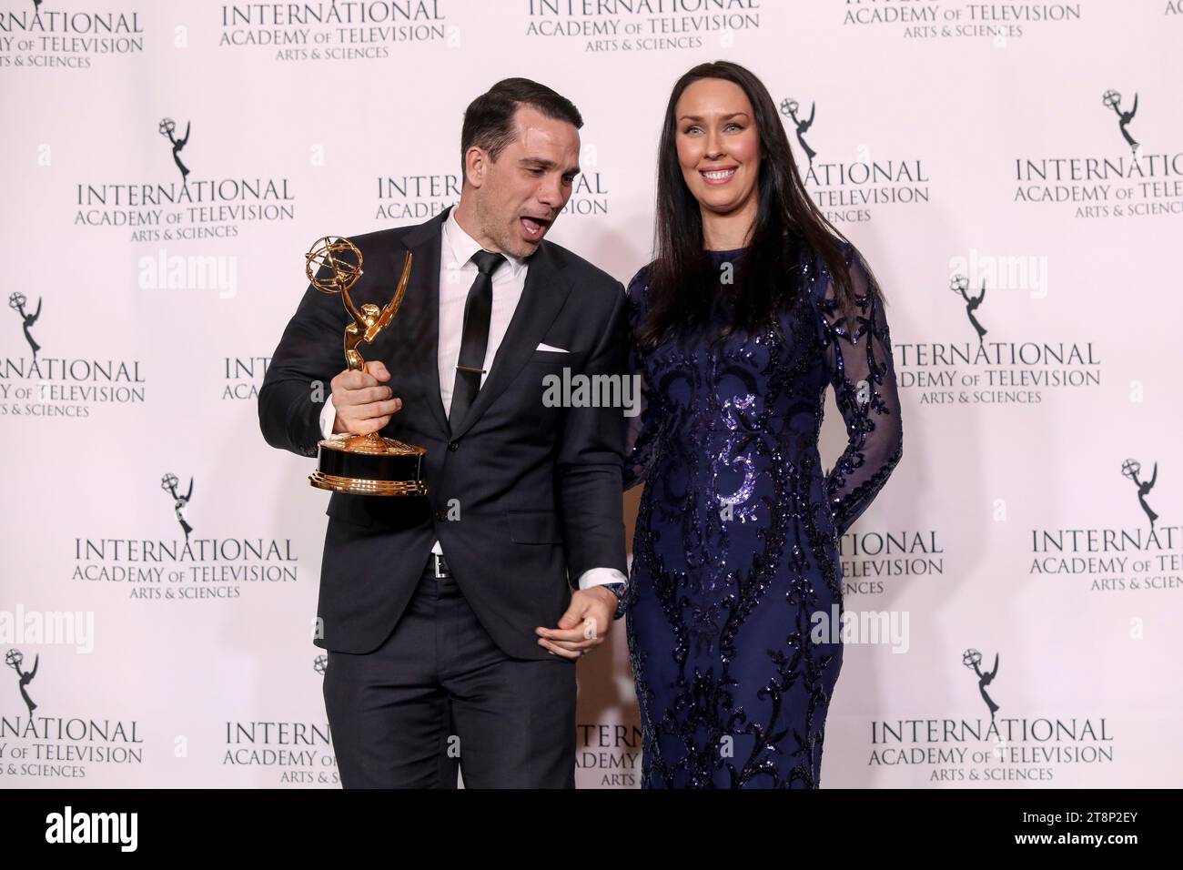 Phil Breslin, left, and Brianna Lyons pose in the press room with the ...