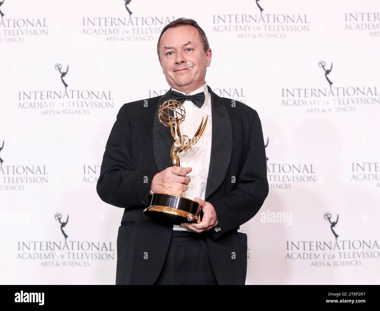 Darren Kemp poses in the press room with the Emmy for best Documentary ...