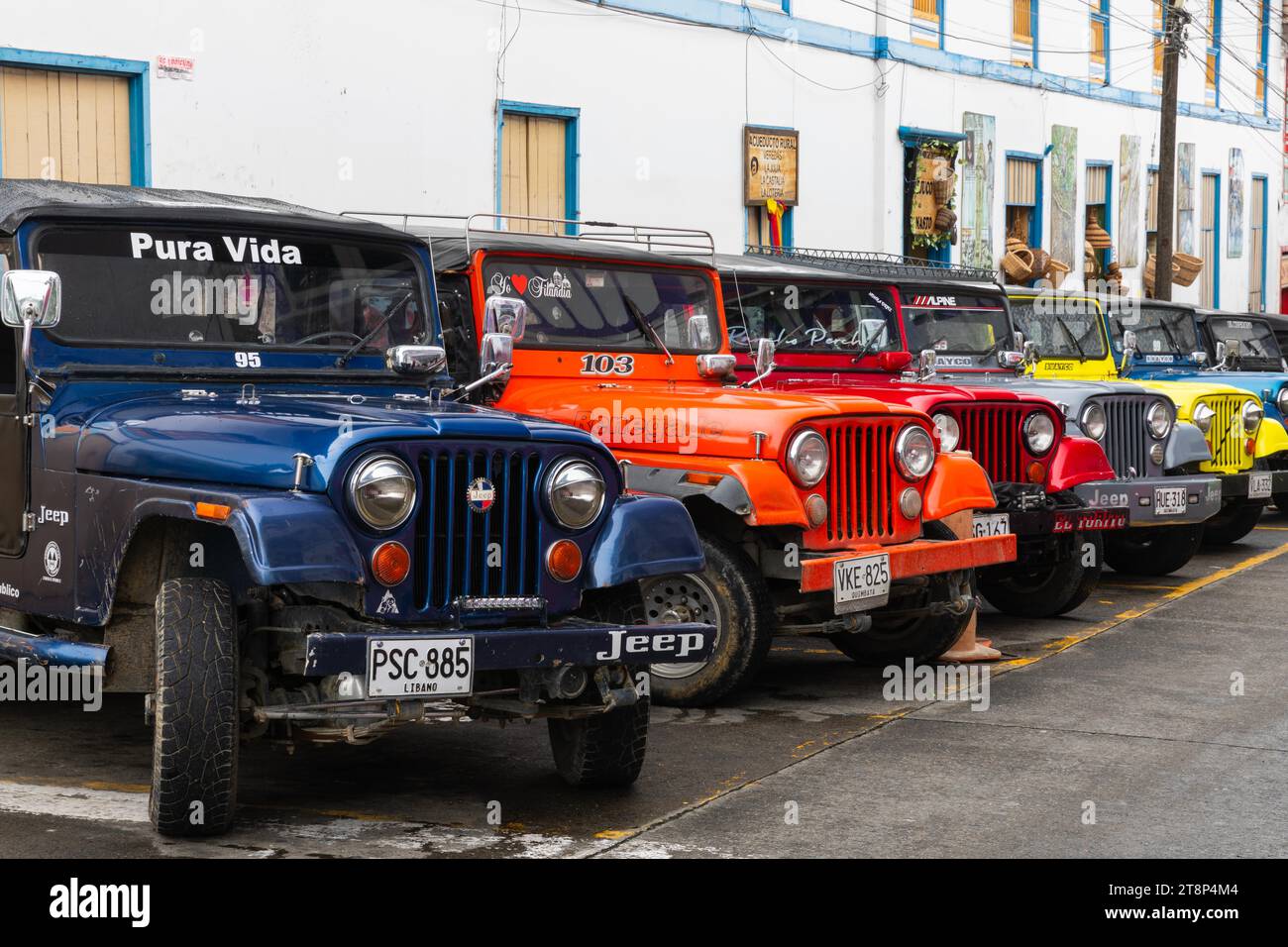Colourful off-road vehicles of coffee farmers in a row, Filandia ...