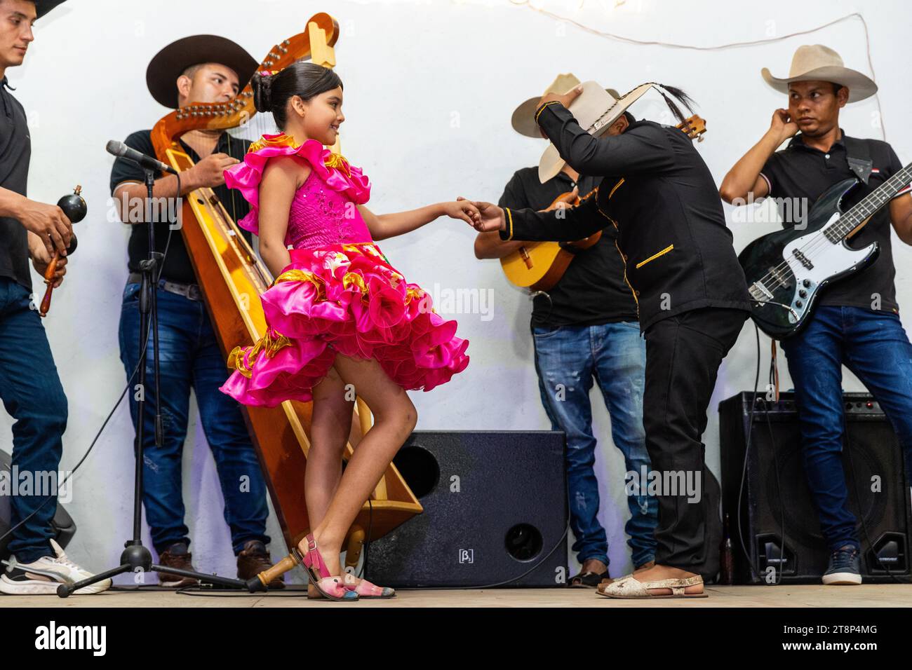 Dancing couple at Floklereabend, boy, girl, music band, La Macarena ...