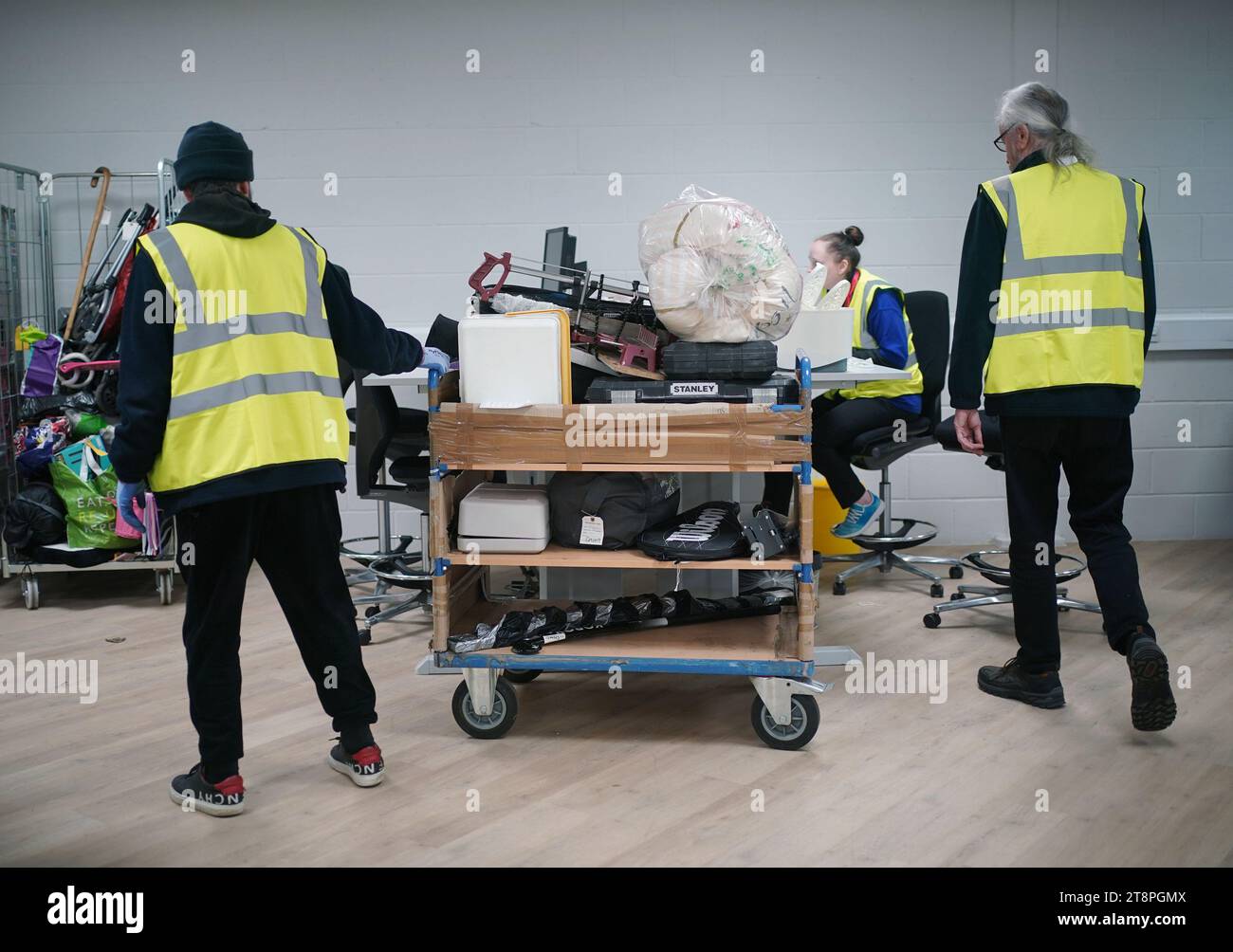 A trolley of items are inputted onto the database to help reunite ...