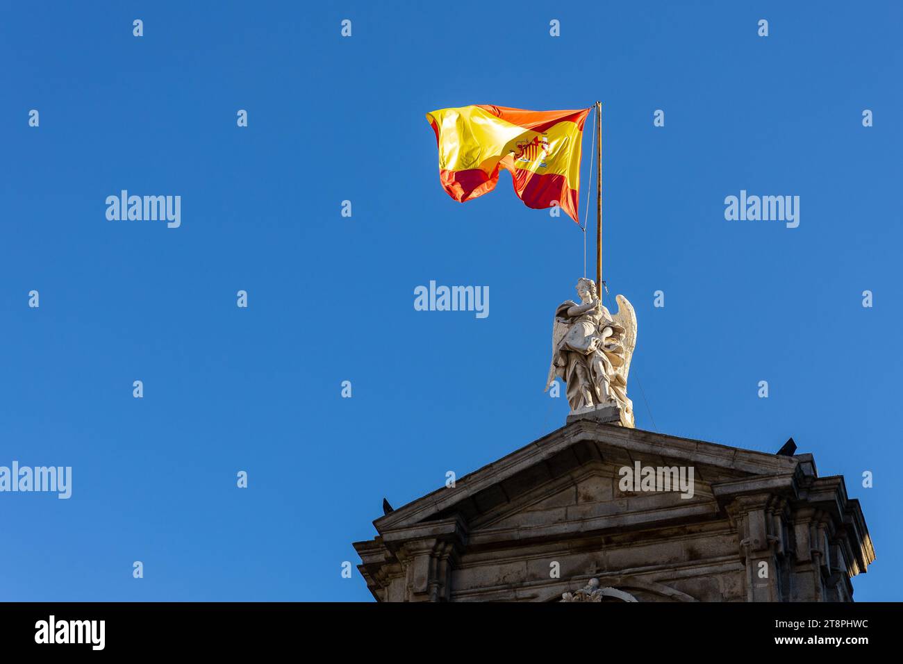 Archangel Michael statue holding Spanish National Flag, above the main ...