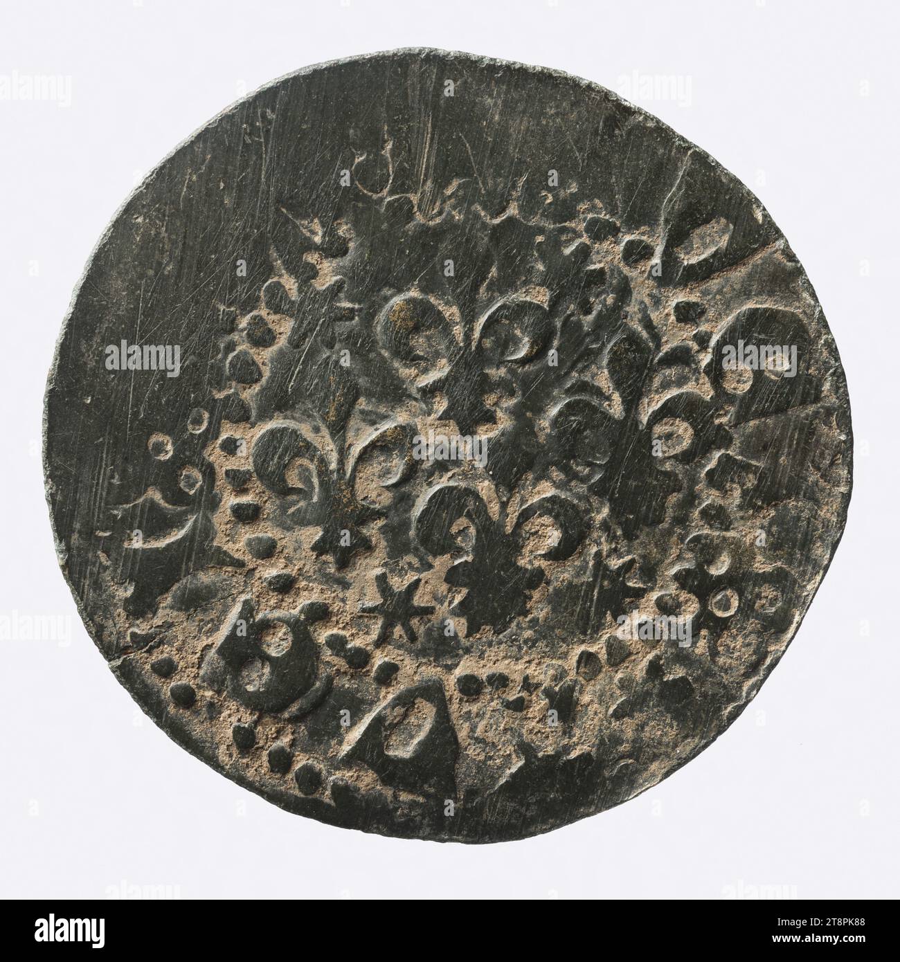 Counting token with four lilies and a cross, 13th-15th century ...