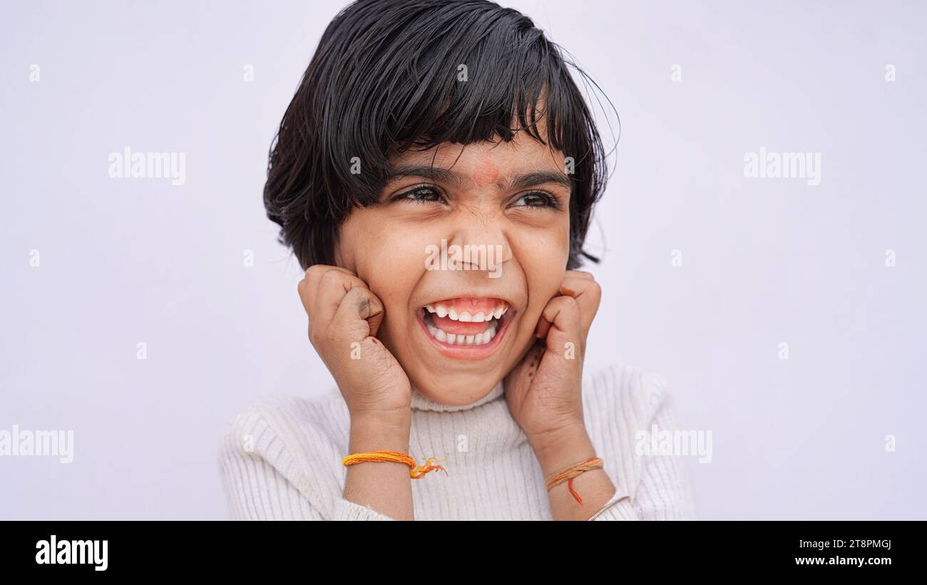 Cute girl cheering carefree and excited. Victory concept Stock Photo ...