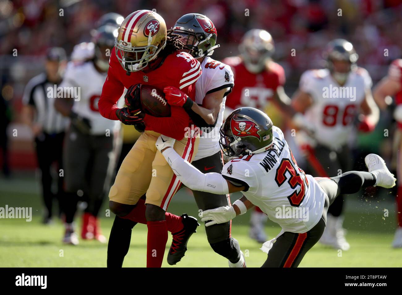 Tampa Bay Buccaneers cornerback Zyon McCollum (27) and safety Antoine Winfield Jr. (31) bring ...