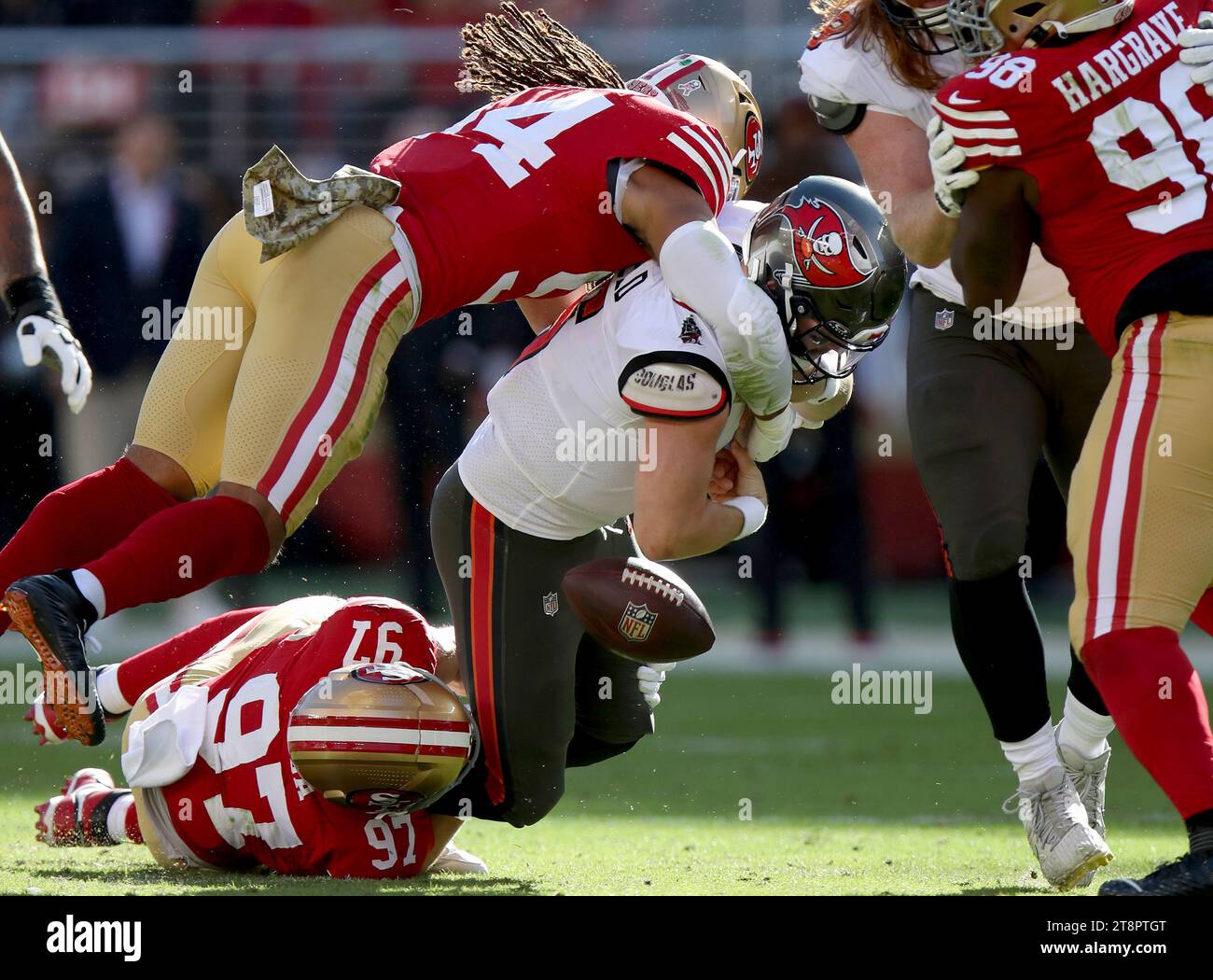 San Francisco 49ers defensive end Nick Bosa (97) and San Francisco ...