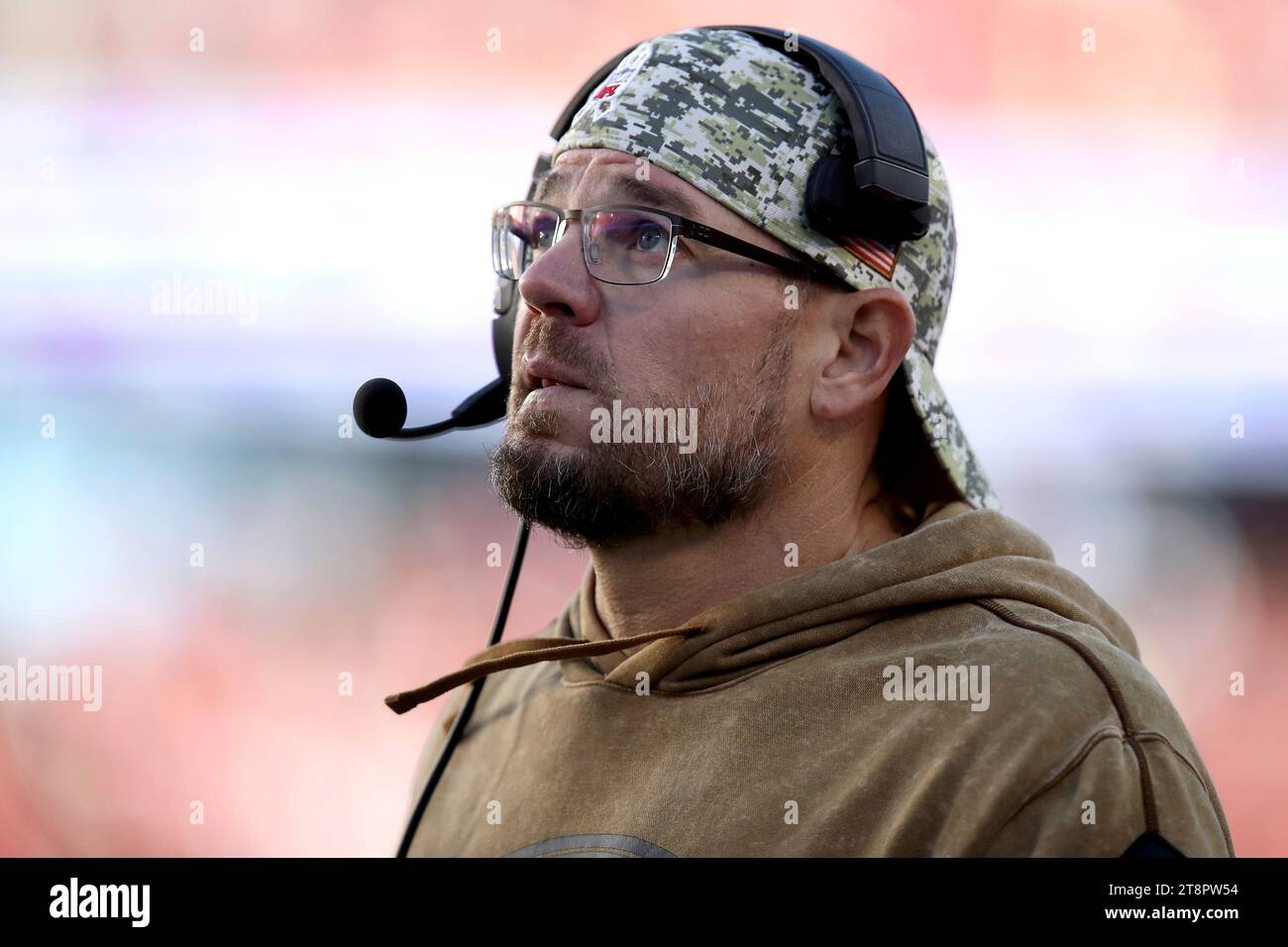 San Francisco 49ers defensive line coach Kris Kocurek walks on the ...