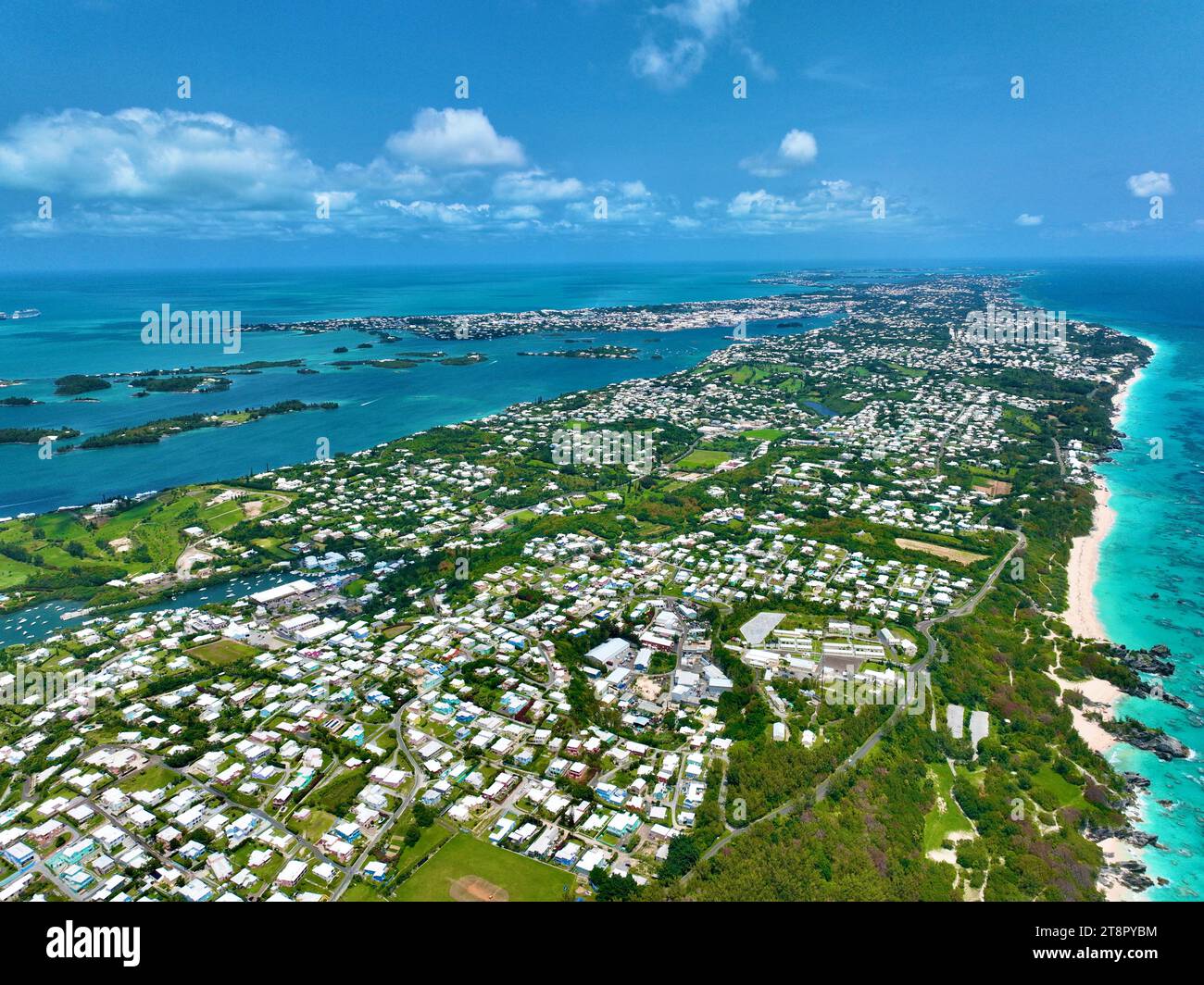 Aerial view of a vibrant cityscape with crystal blue green waters in ...
