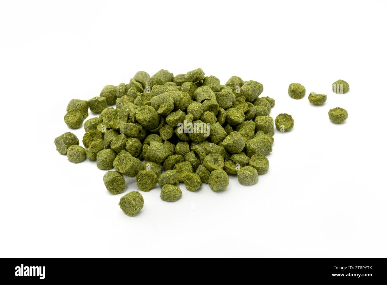Pile of green hops pellets on white background Stock Photo - Alamy