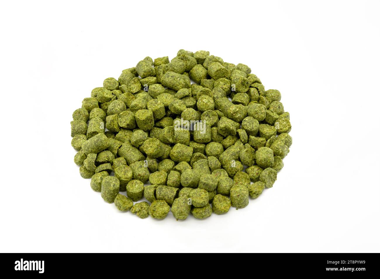Pile of green hops pellets on white background Stock Photo - Alamy