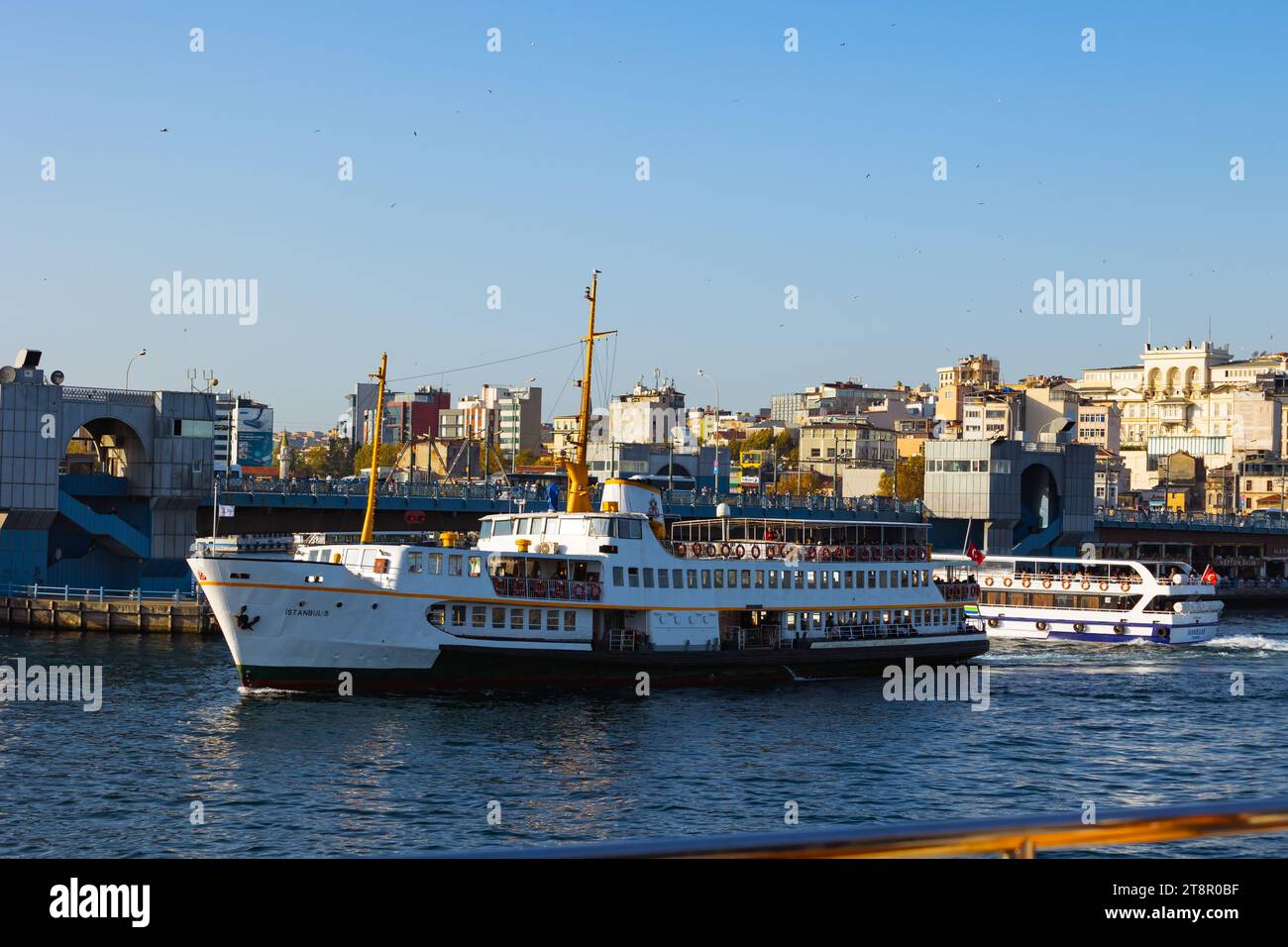 Istanbul's famous ferries background photo. A ferry and Galata Bridge ...