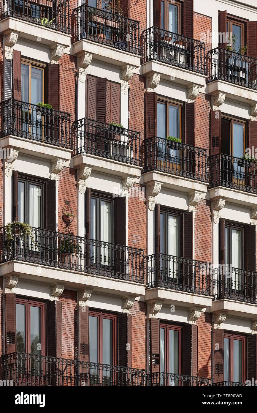 Traditional building facade in Madrid city center. Red bricks. Spain ...