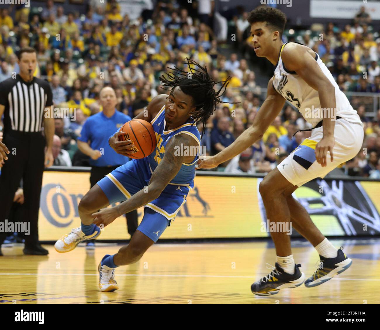 Ucla Guard Sebastian Mack 12 Gets Past Marquette Forward Oso Ighodaro