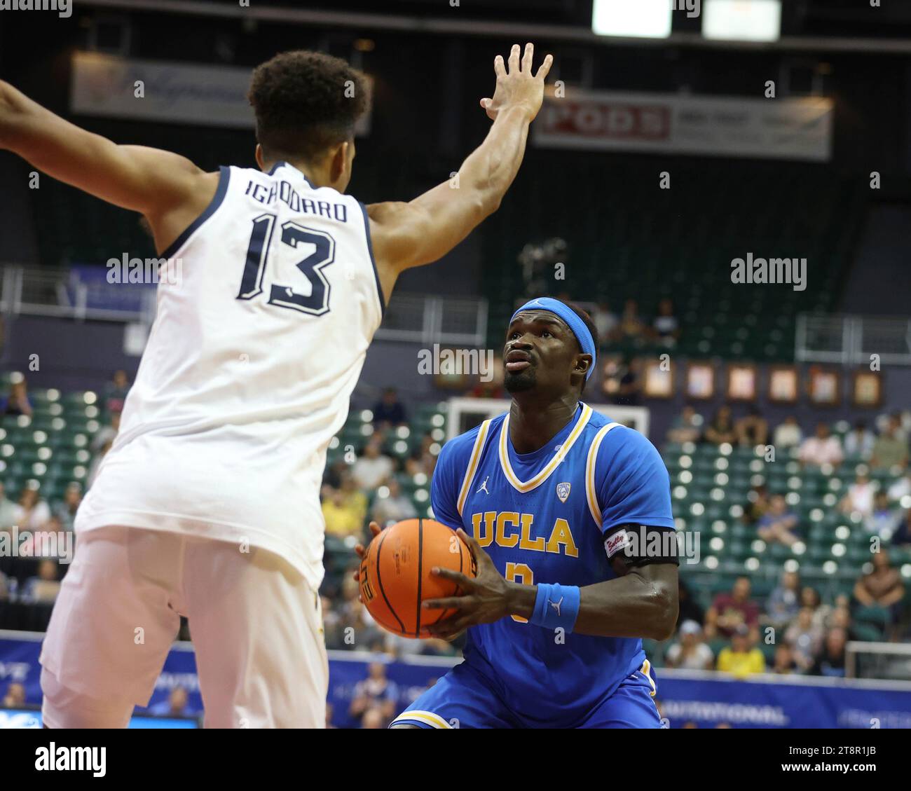 Ucla Forward Adem Bona 3 Tries To Shoot Over Marquette Forward Oso