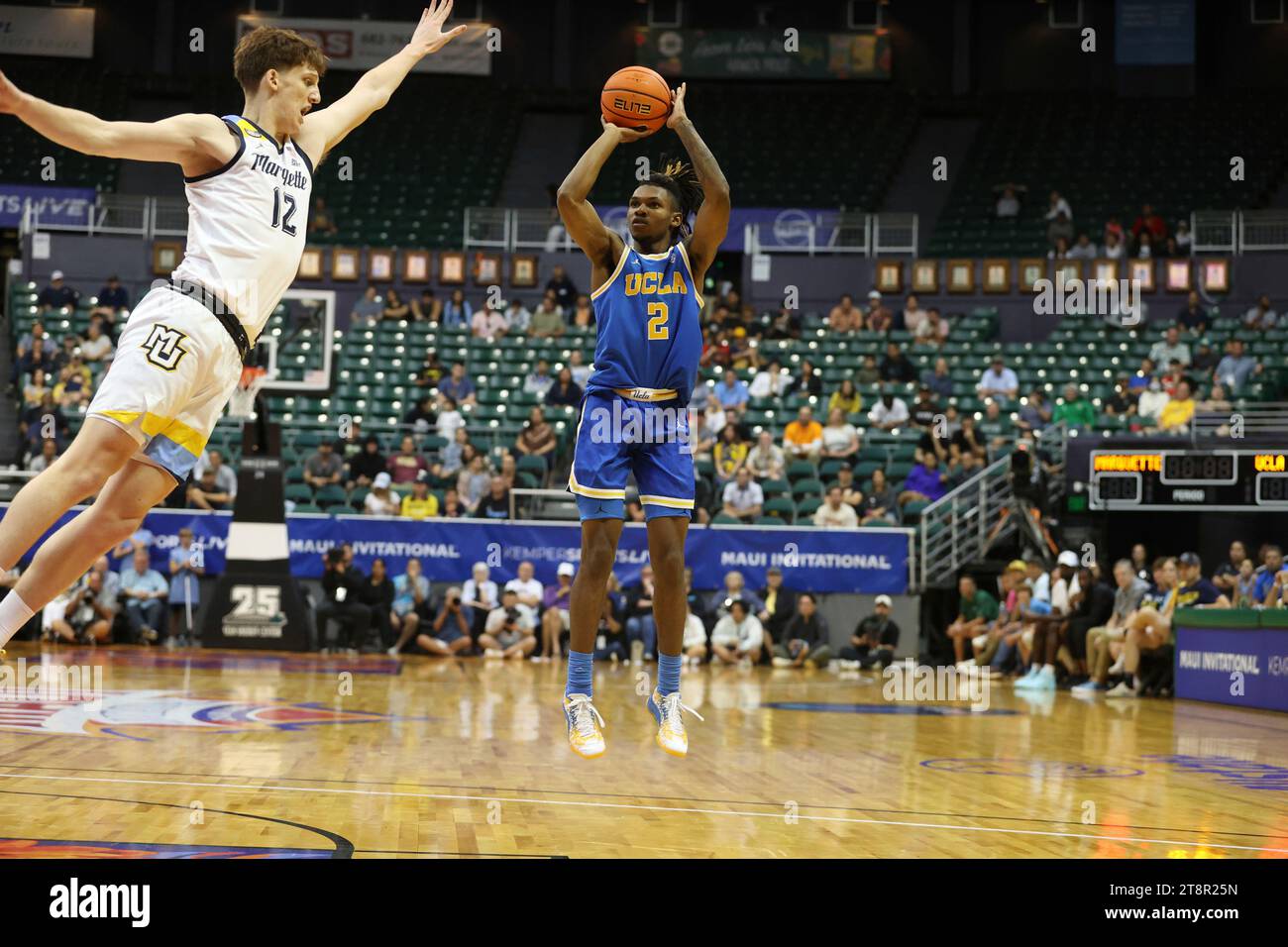 UCLA guard Dylan Andrews (2) shoots over Marquette forward Ben Gold (12 ...