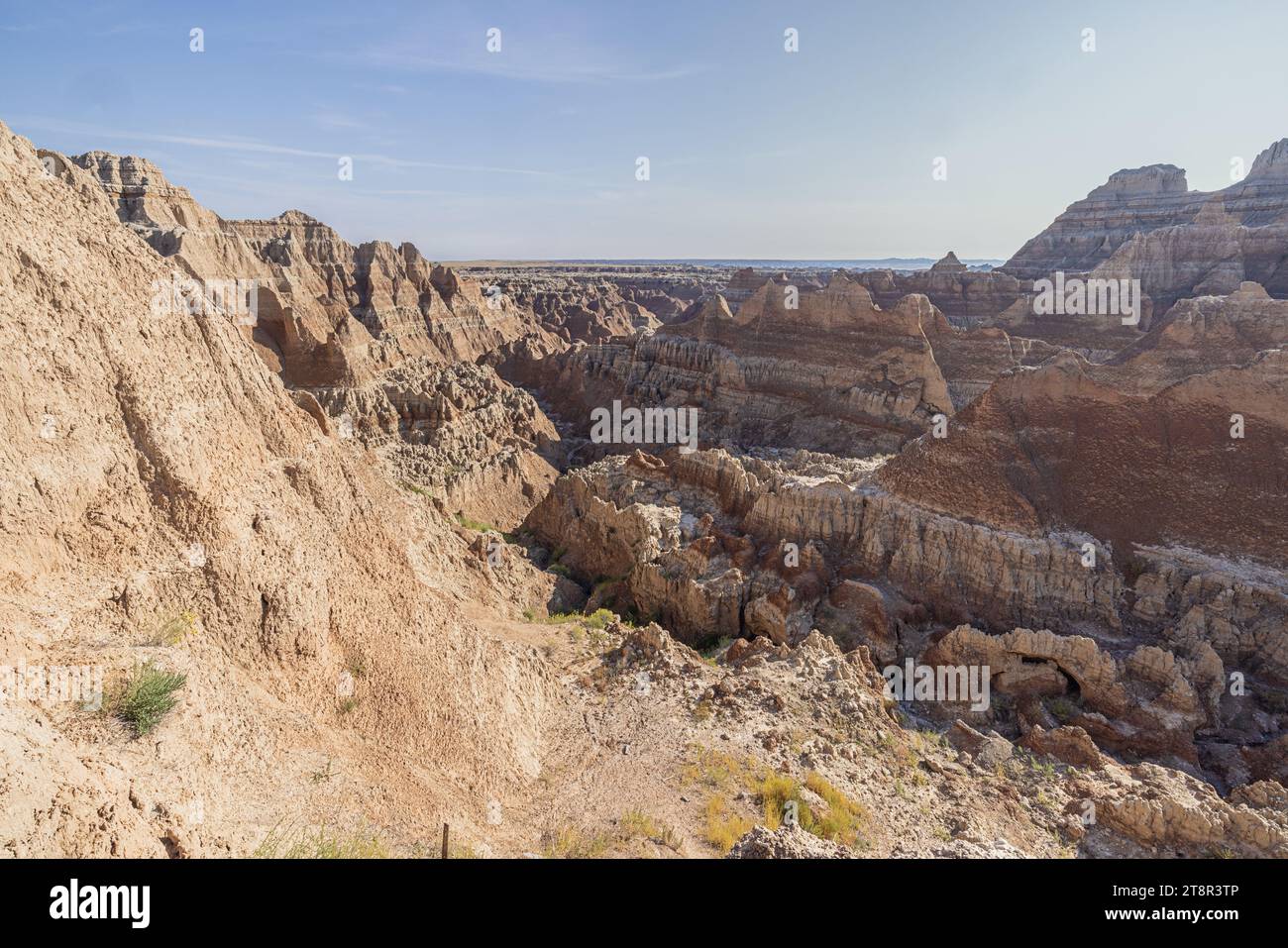 The rugged landscape of the Badlands at the Windows TYrail Stock Photo ...