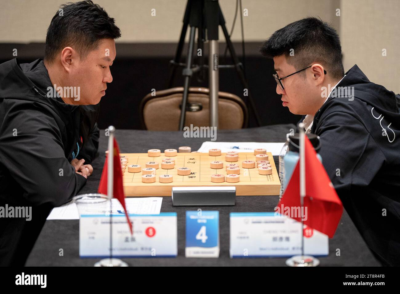 Houston, USA. 20th Nov, 2023. Meng Chen (L) of China competes against ...